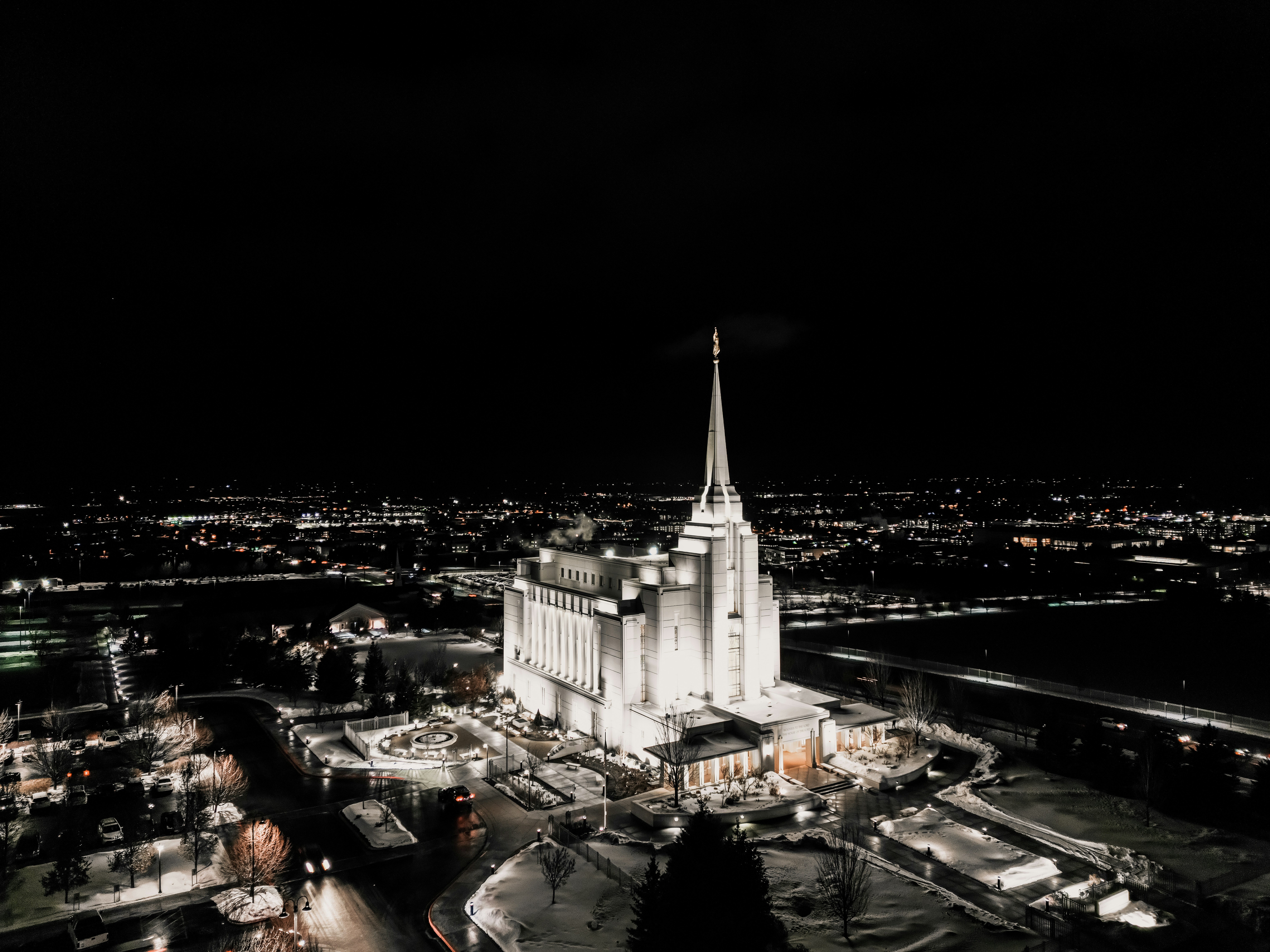 An aerial view of a church at night photo – Free Rexburg temple night ...