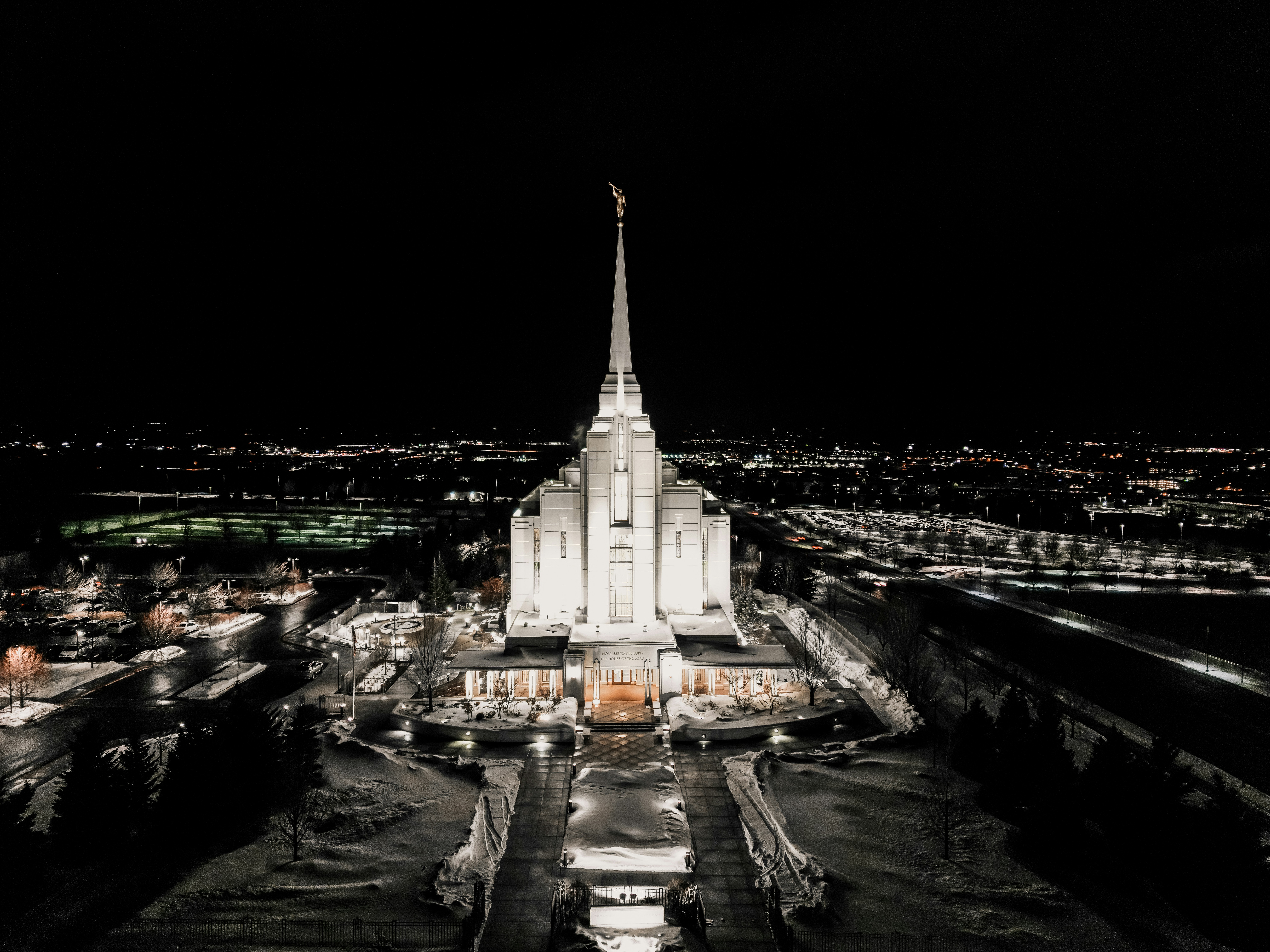 Temple Monument at Night: A Shard of Light Over a Serene Plaza