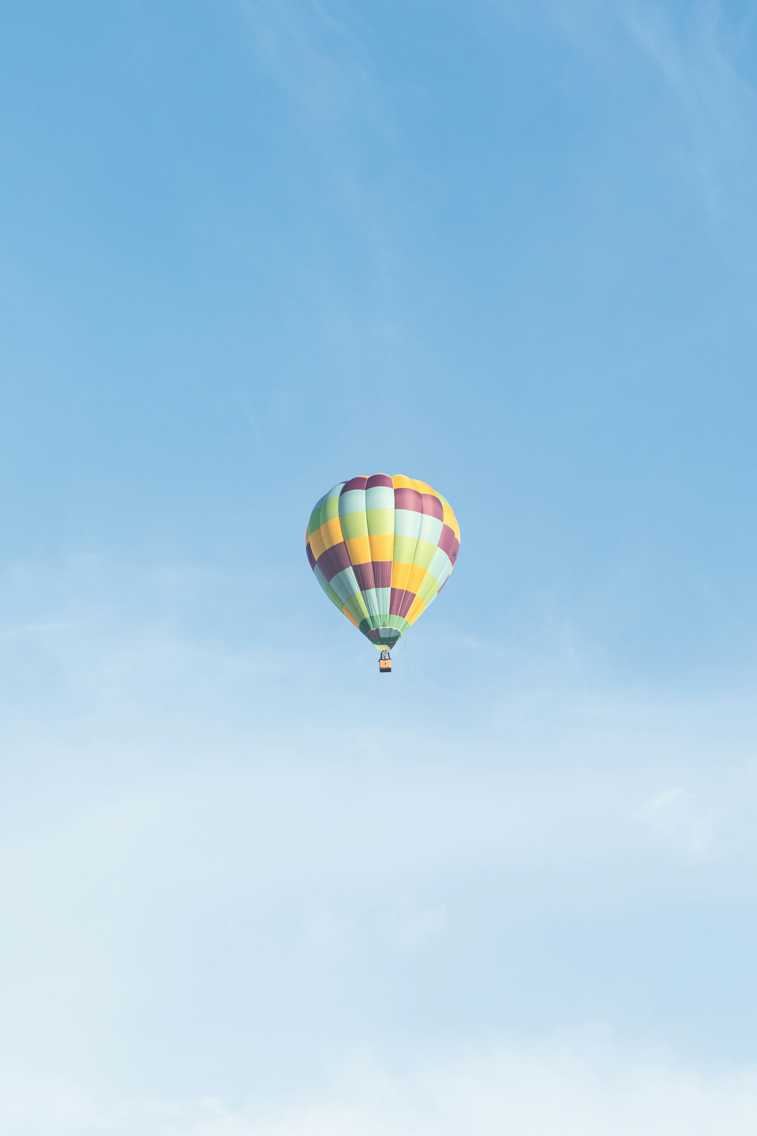 Rainbow Ascension Over a Cerulean Sky