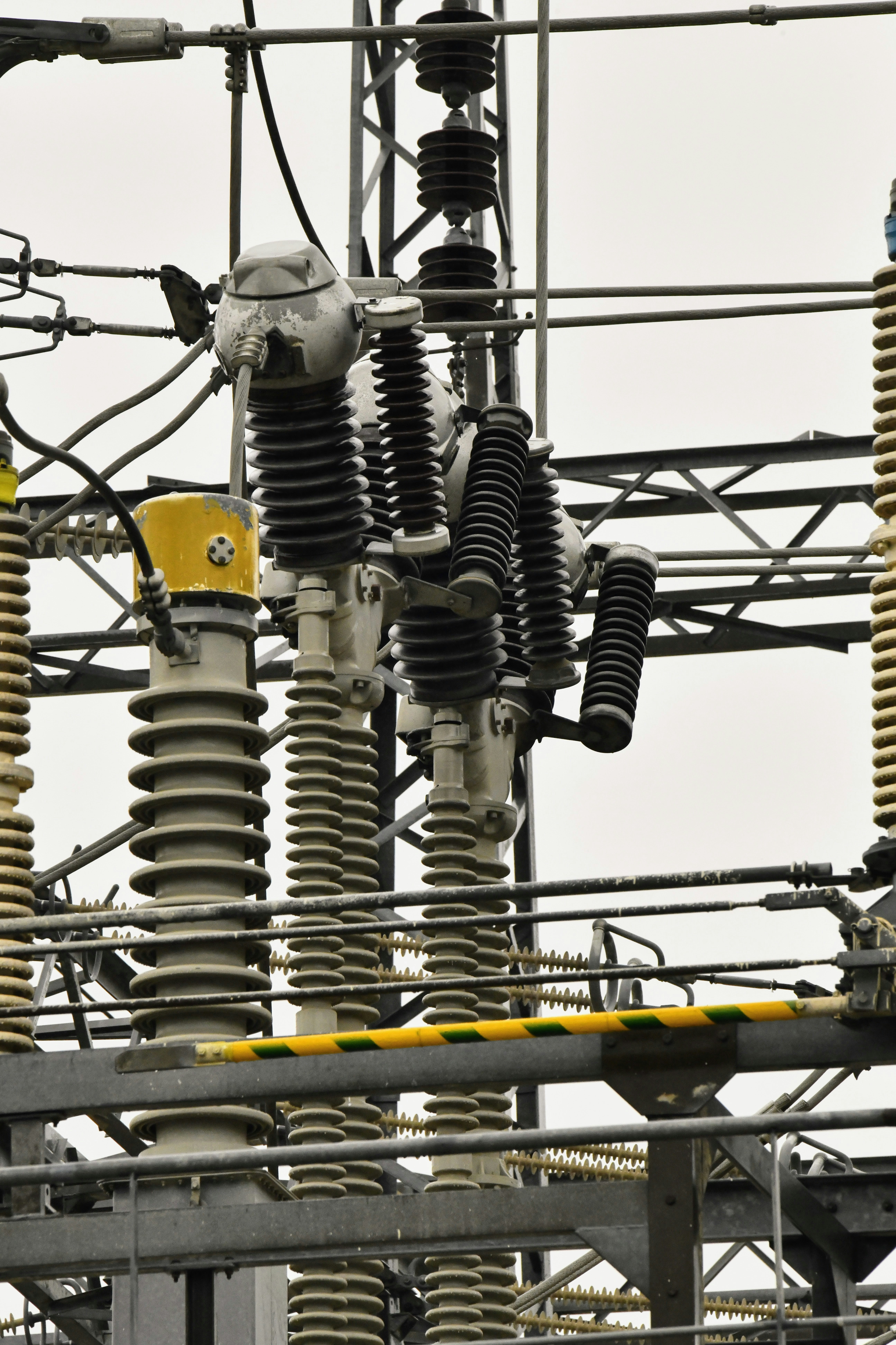 A bunch of power lines and wires with a sky in the background photo ...