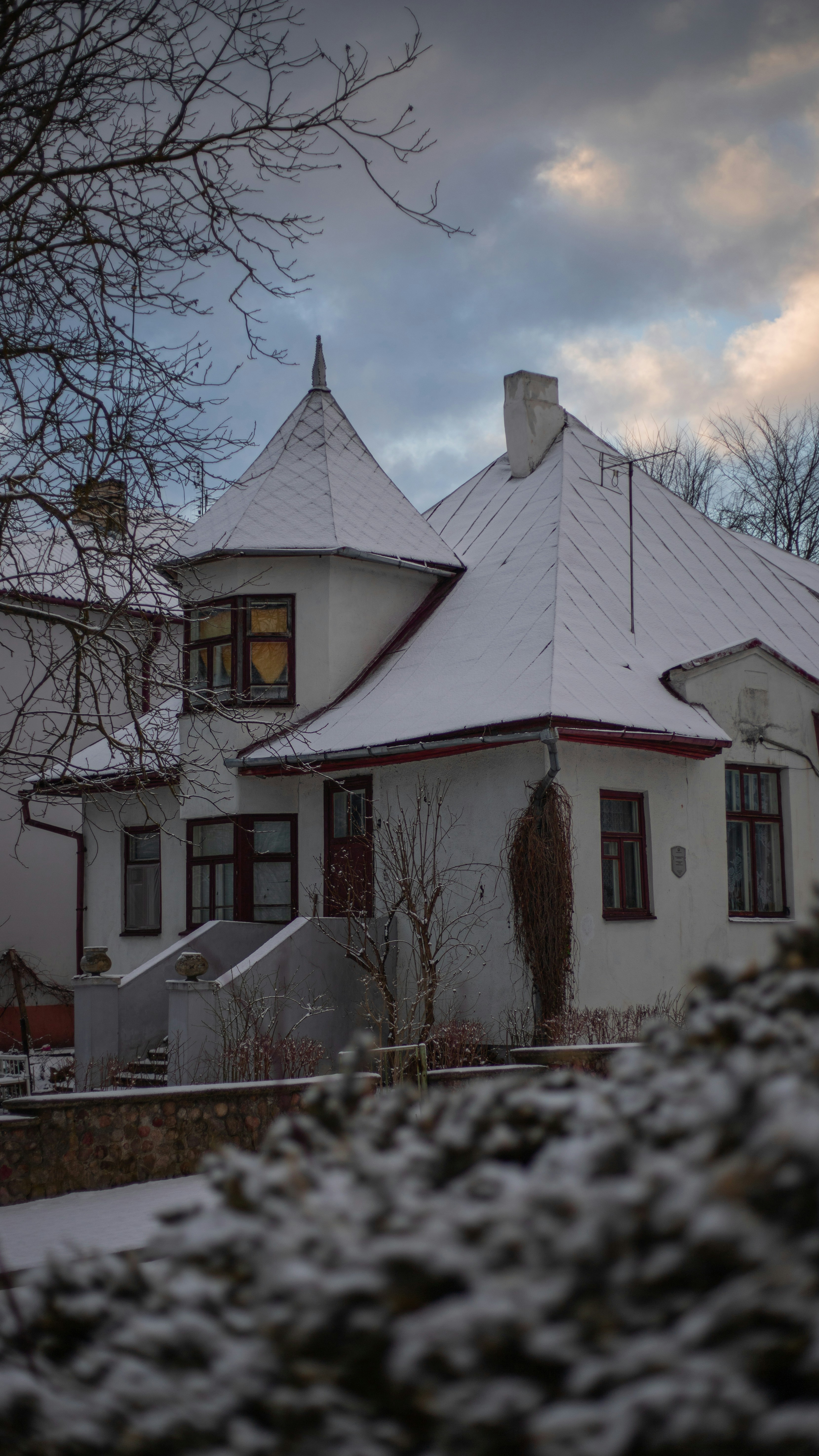 Snowbound Manor Under A Sky of Soft Winter Light