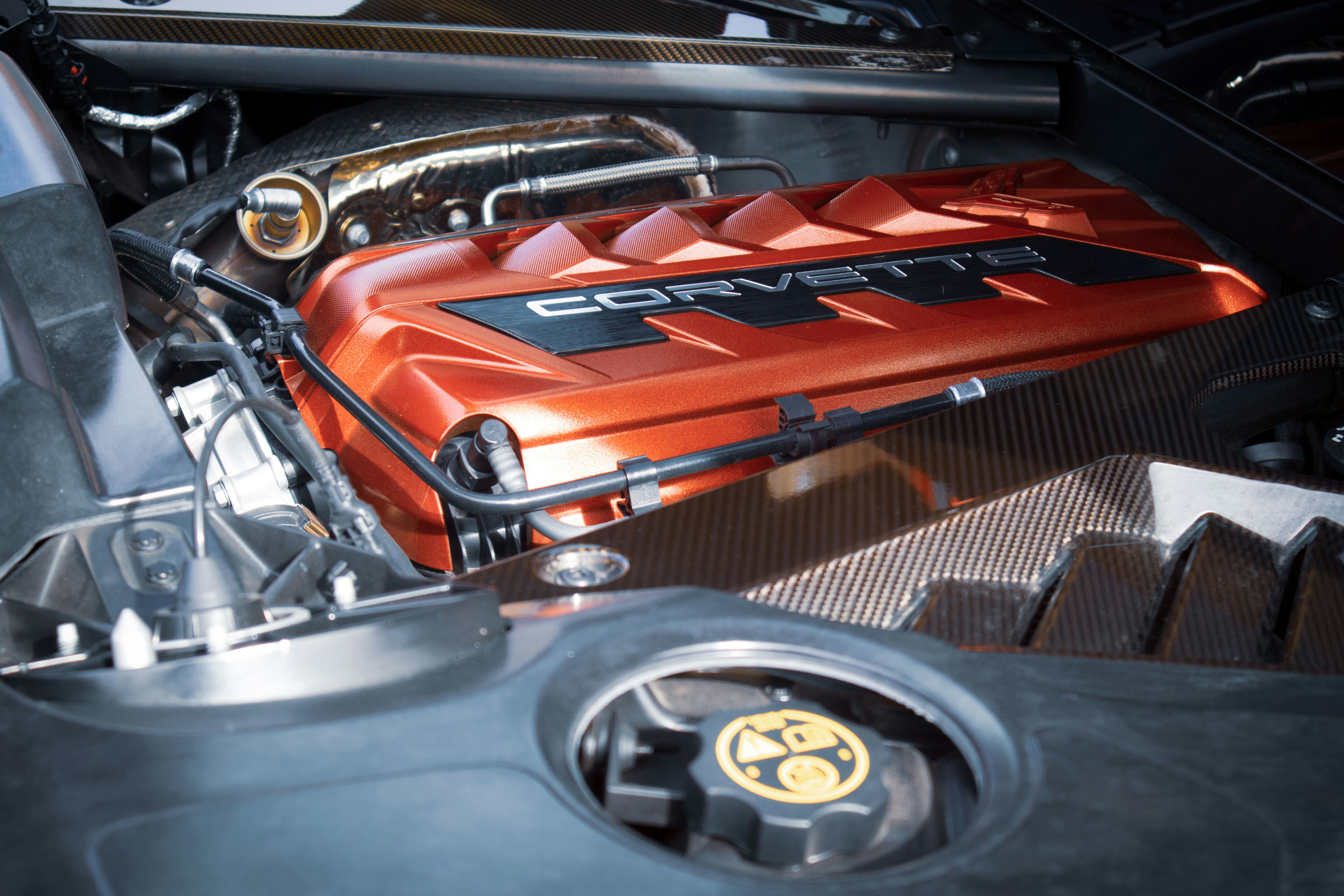 A close up of the engine of a car photo – Free Engine Image on Unsplash