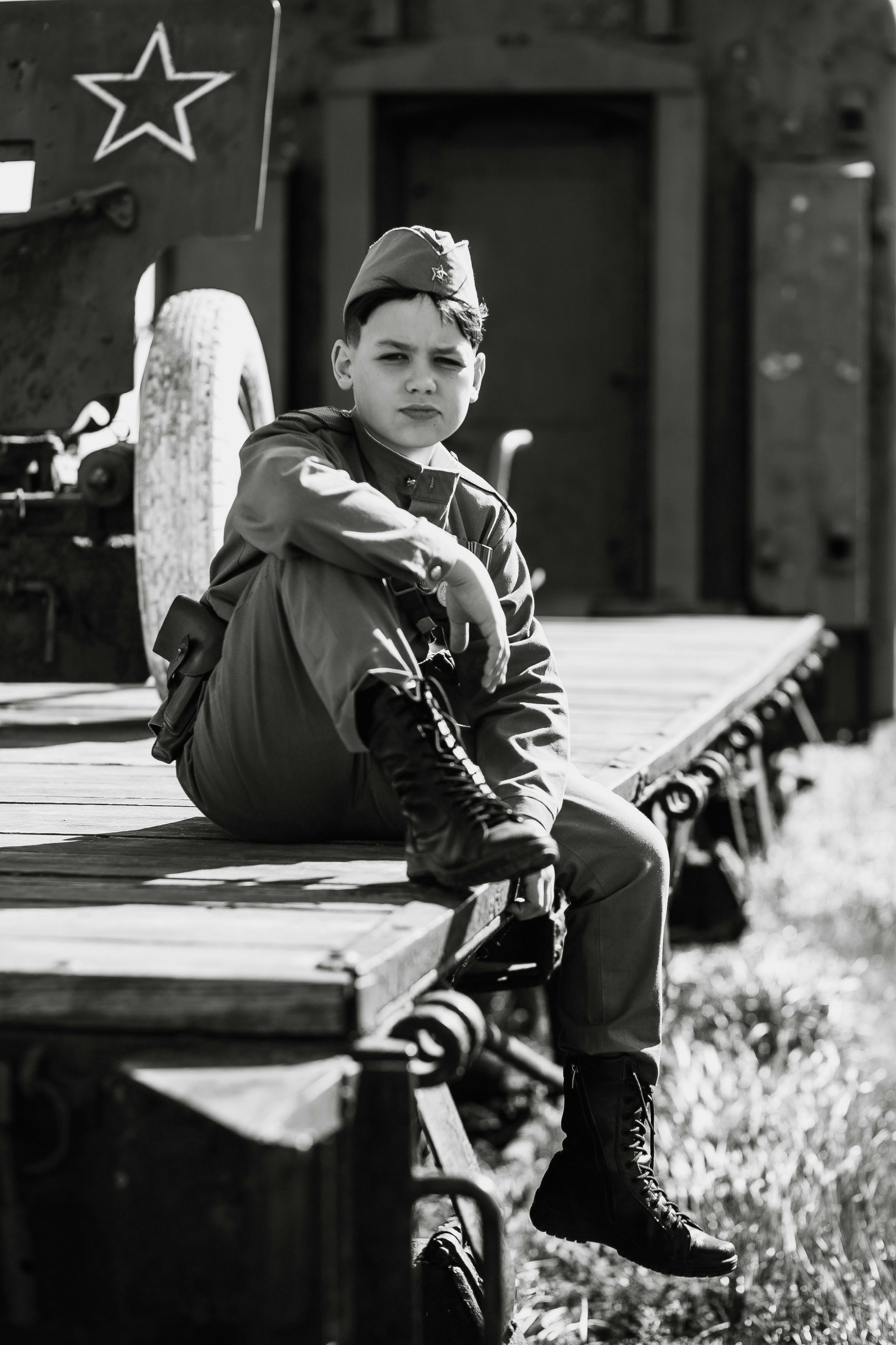Quiet Resolve: A Young Soldier Pauses on the Platform