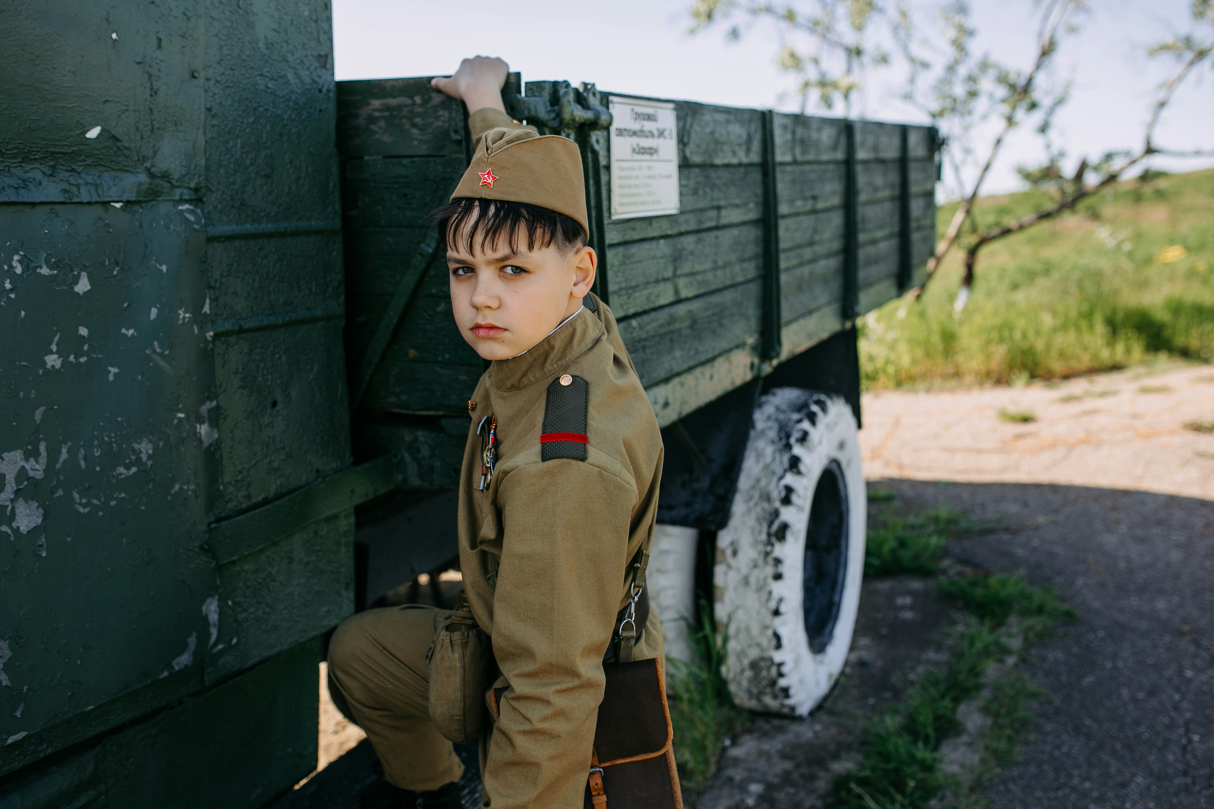 Yellow Star in the Old Wagon: A Quiet Portrait of a Young Recruit