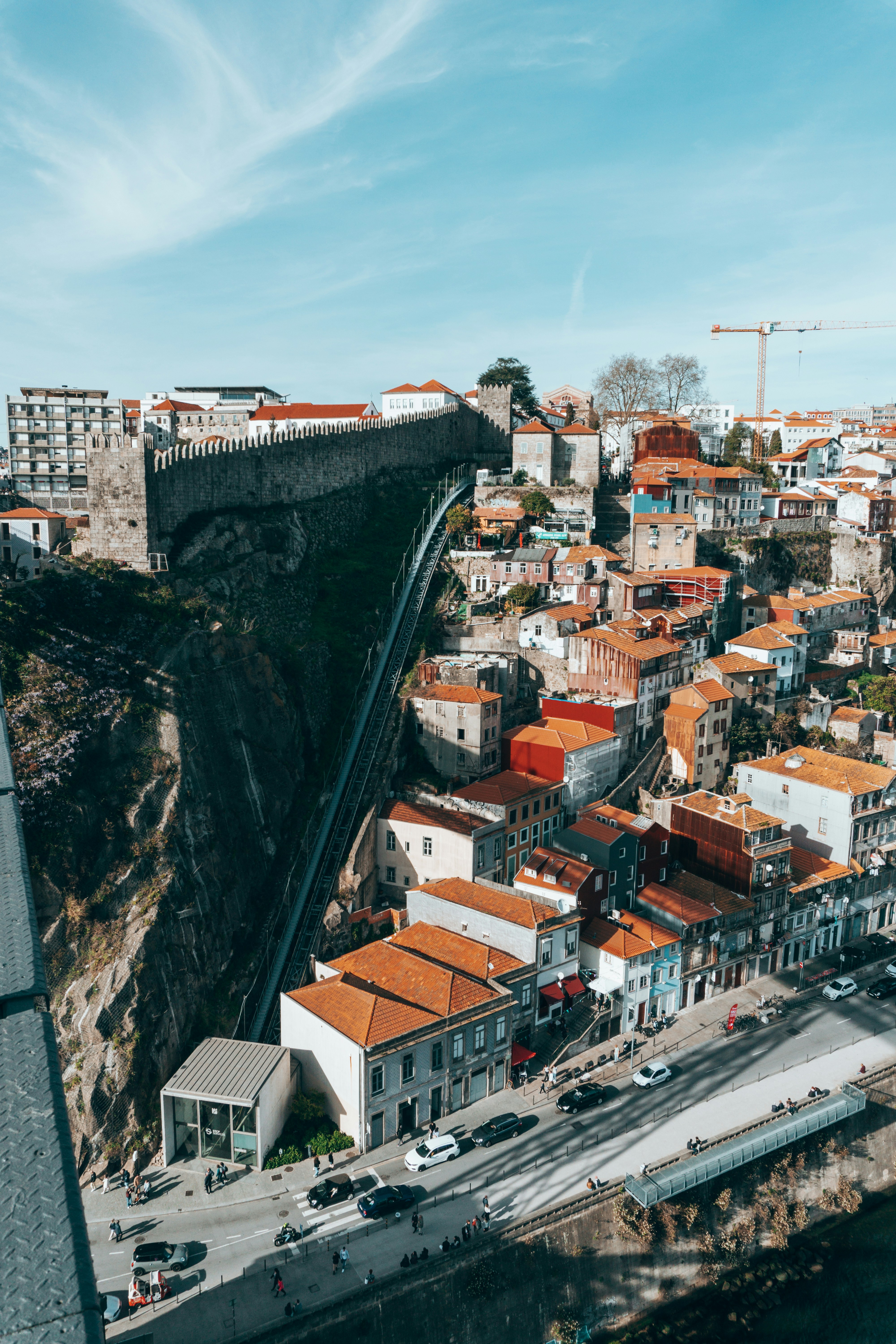 an aerial view of a city with a bridge