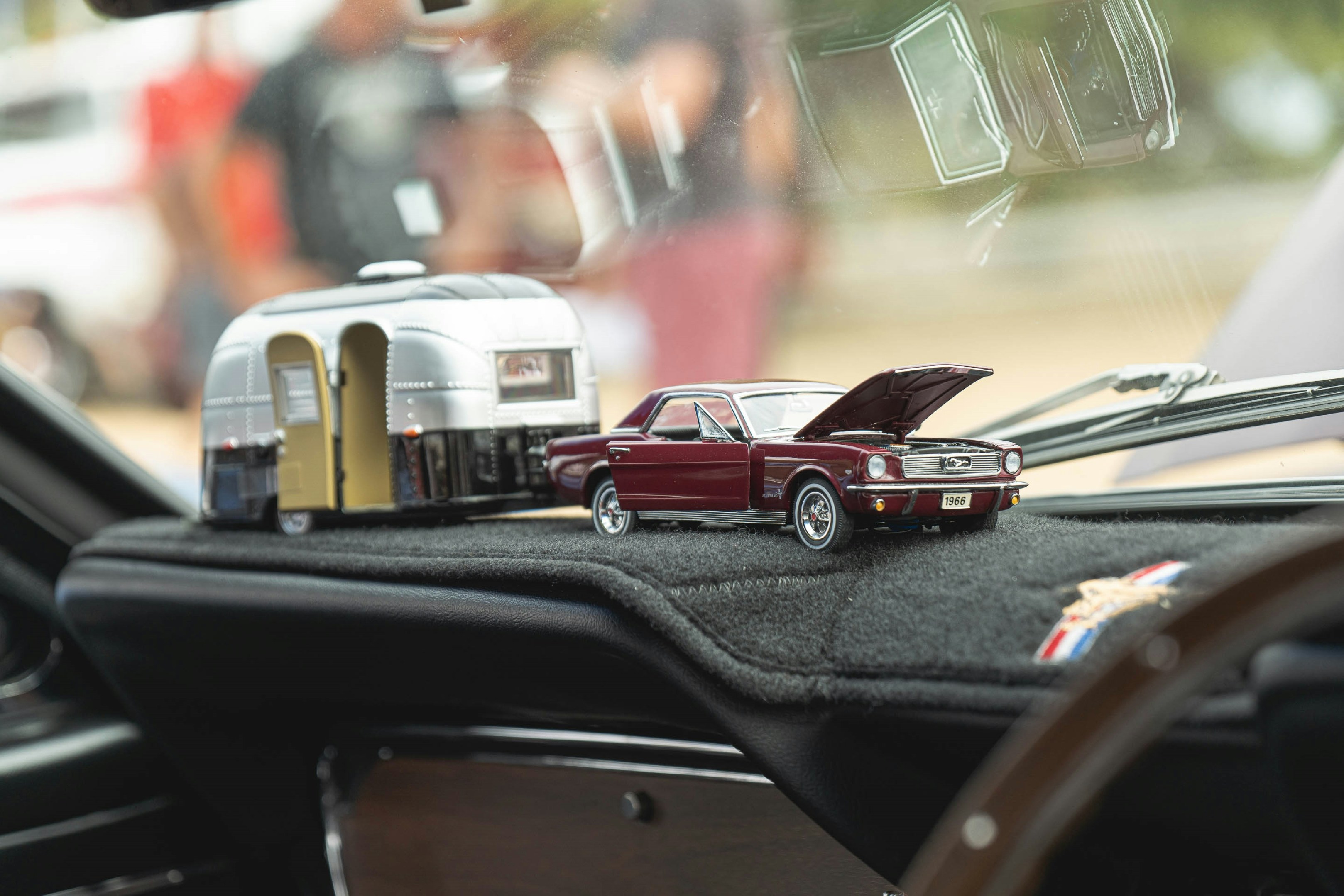 Tiny Convoy on a Leather Dashboard: A Nostalgia-Infused Miniature Scene