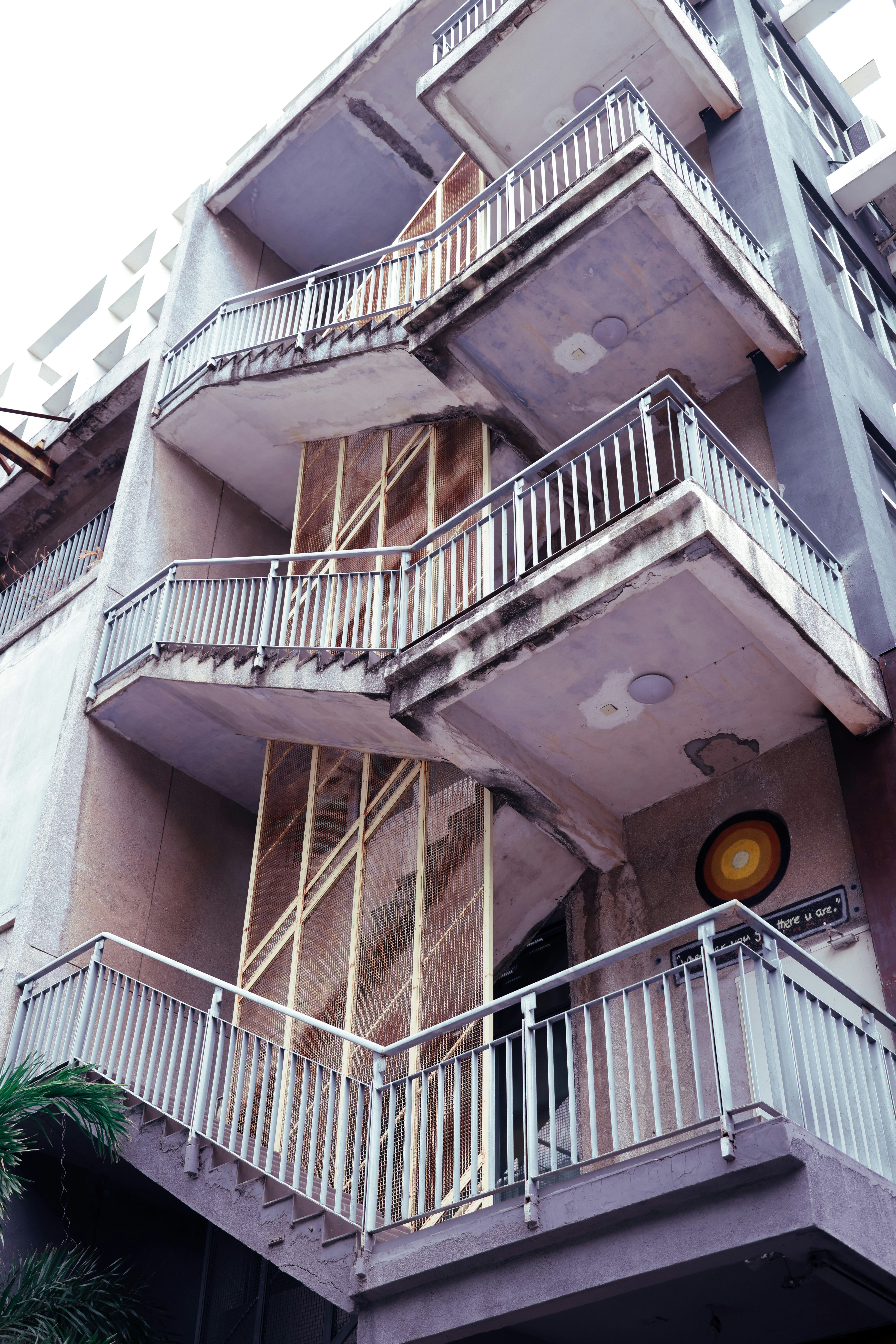 a tall building with a bunch of balconies