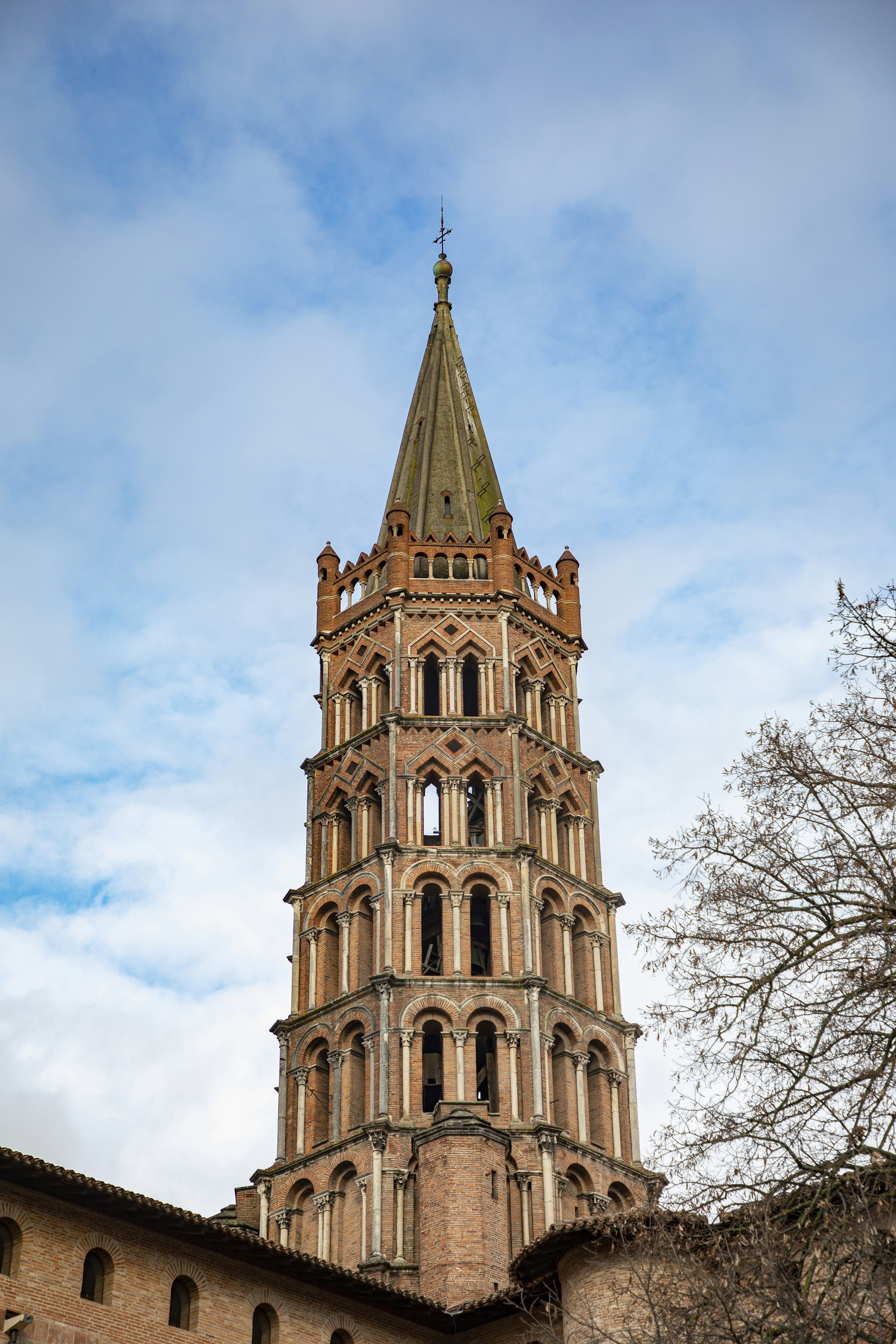 Brick Bell Tower Reaching Toward a Cerulean Sky