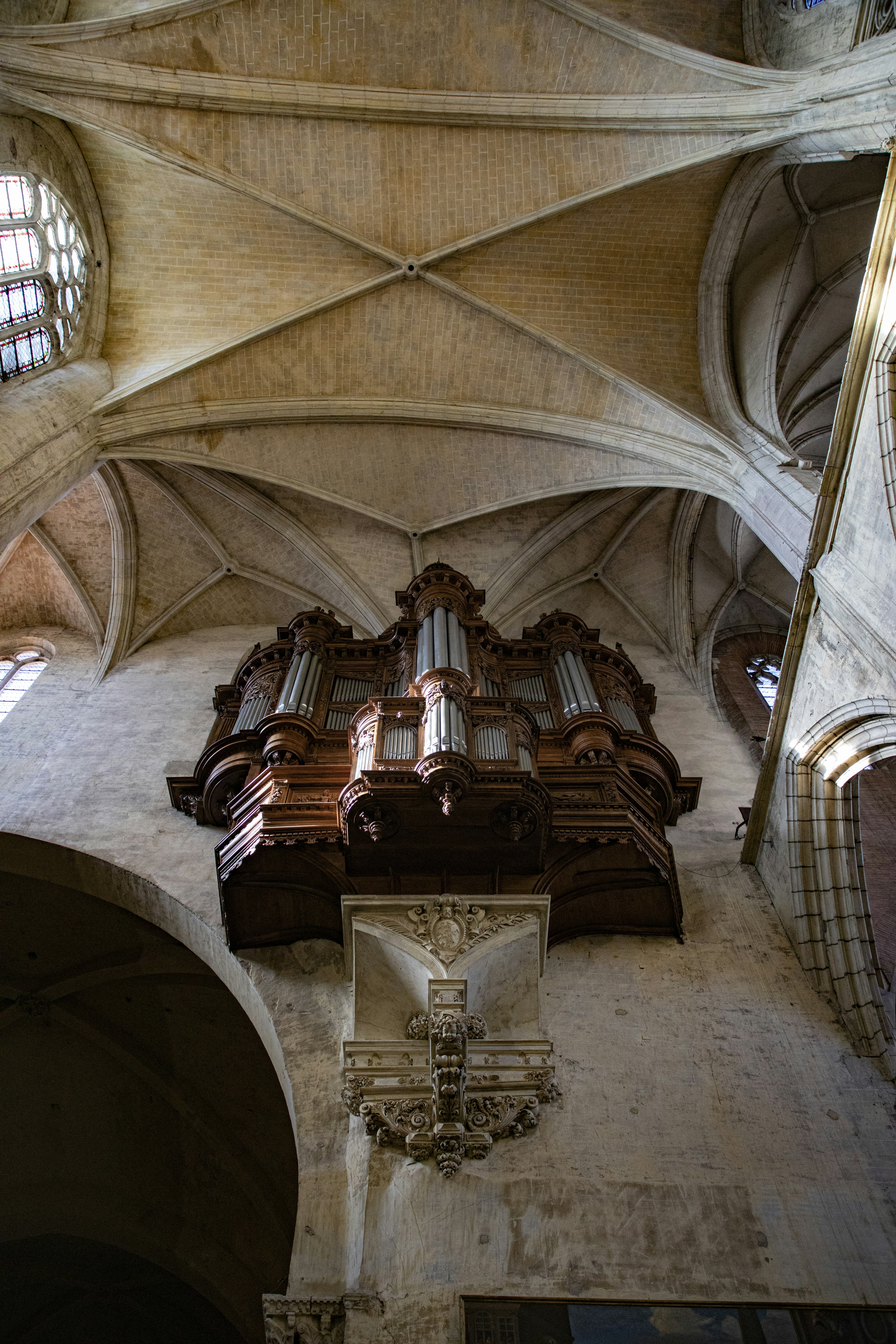 Ribbed Vaults and a Hanging Organ in a Gothic Cathedral