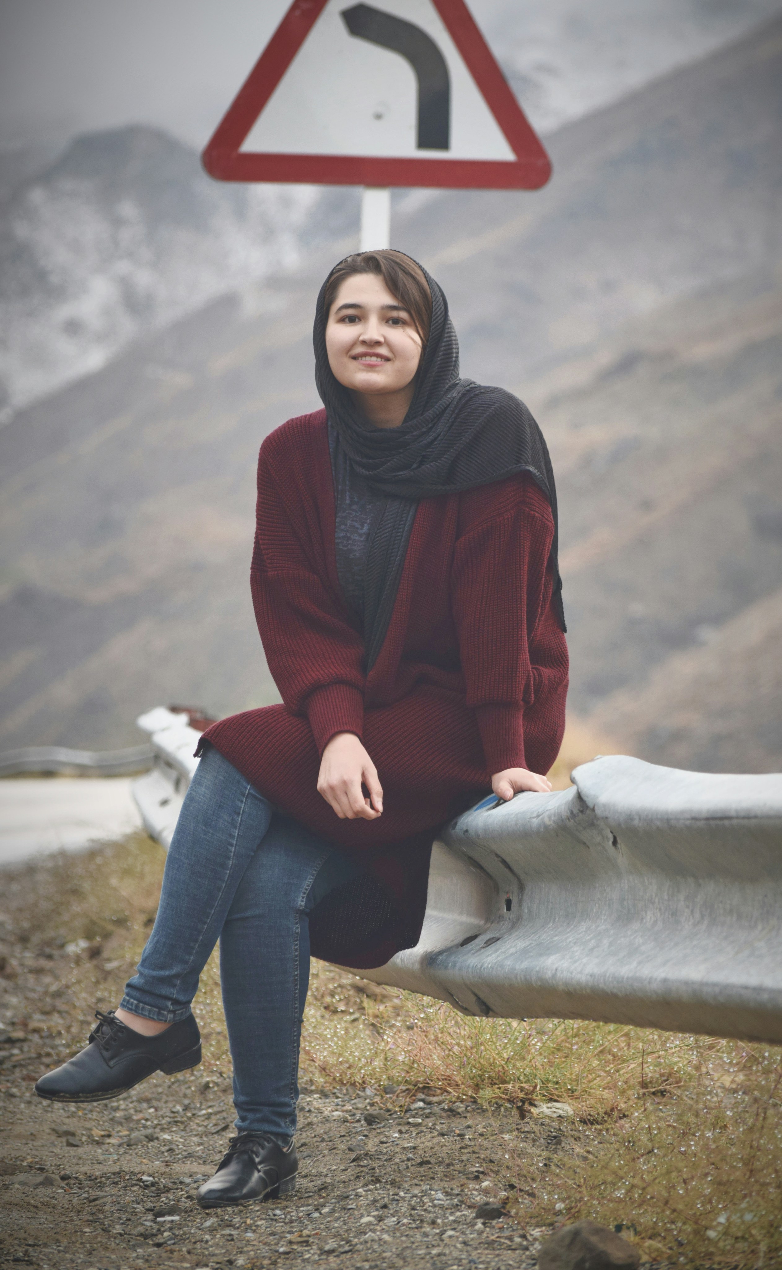 Pause at the Bend: Portrait by a Mountain Road