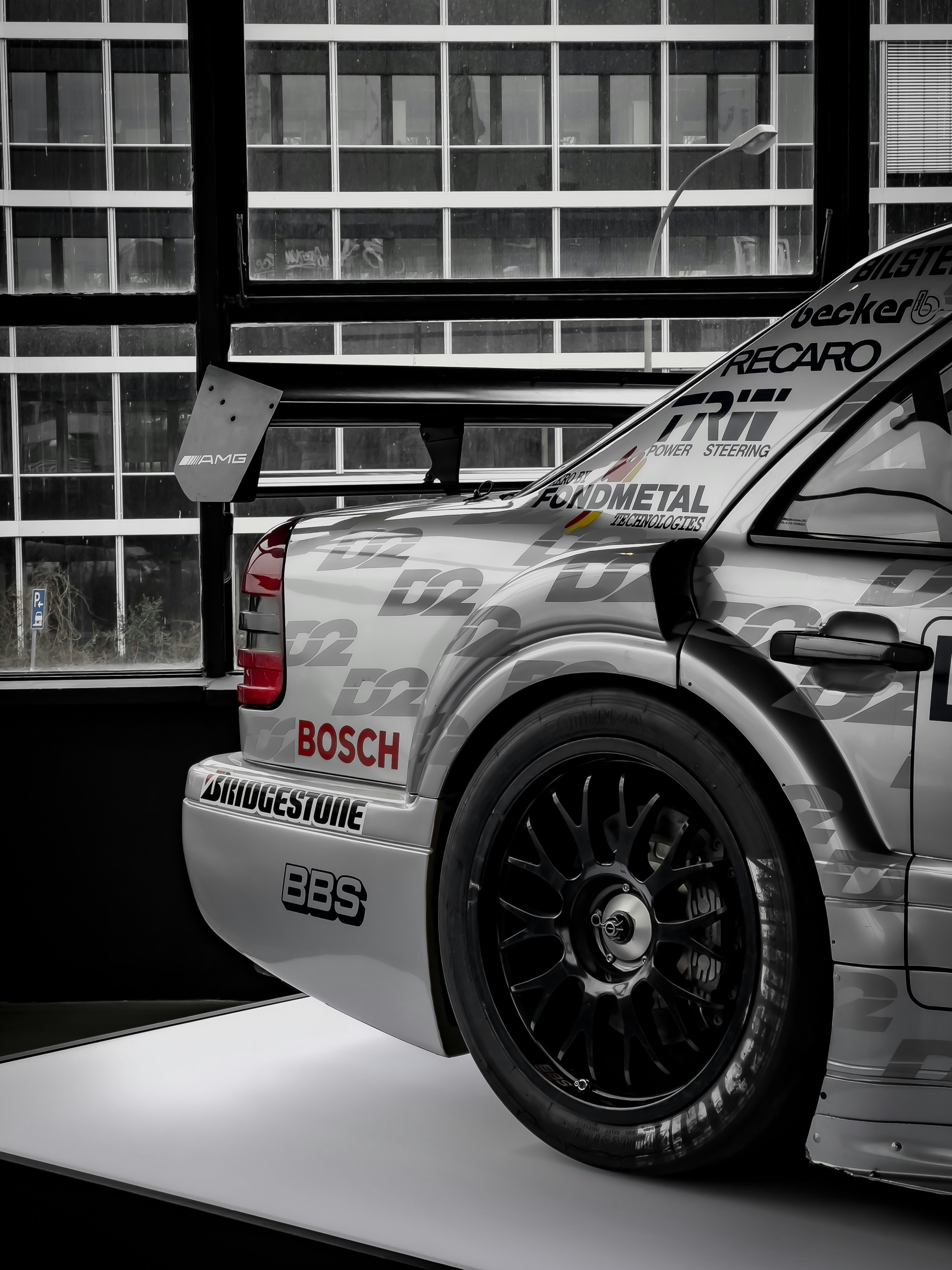 Rear-Quarter in Studio Light: Decals, Spokes, and Shadow