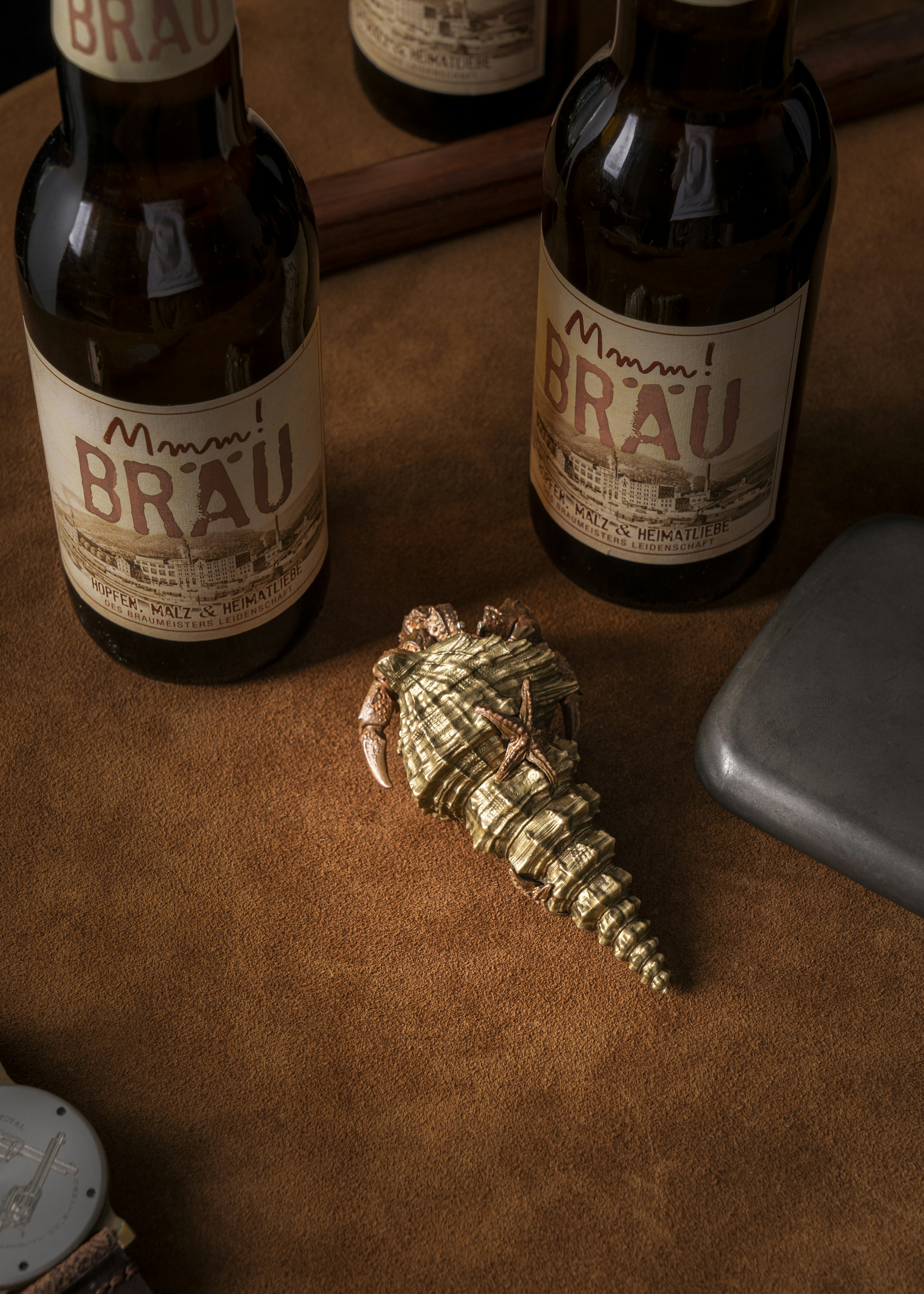 Amber Bottles and a Sea Shell: Quiet Still Life on Leather