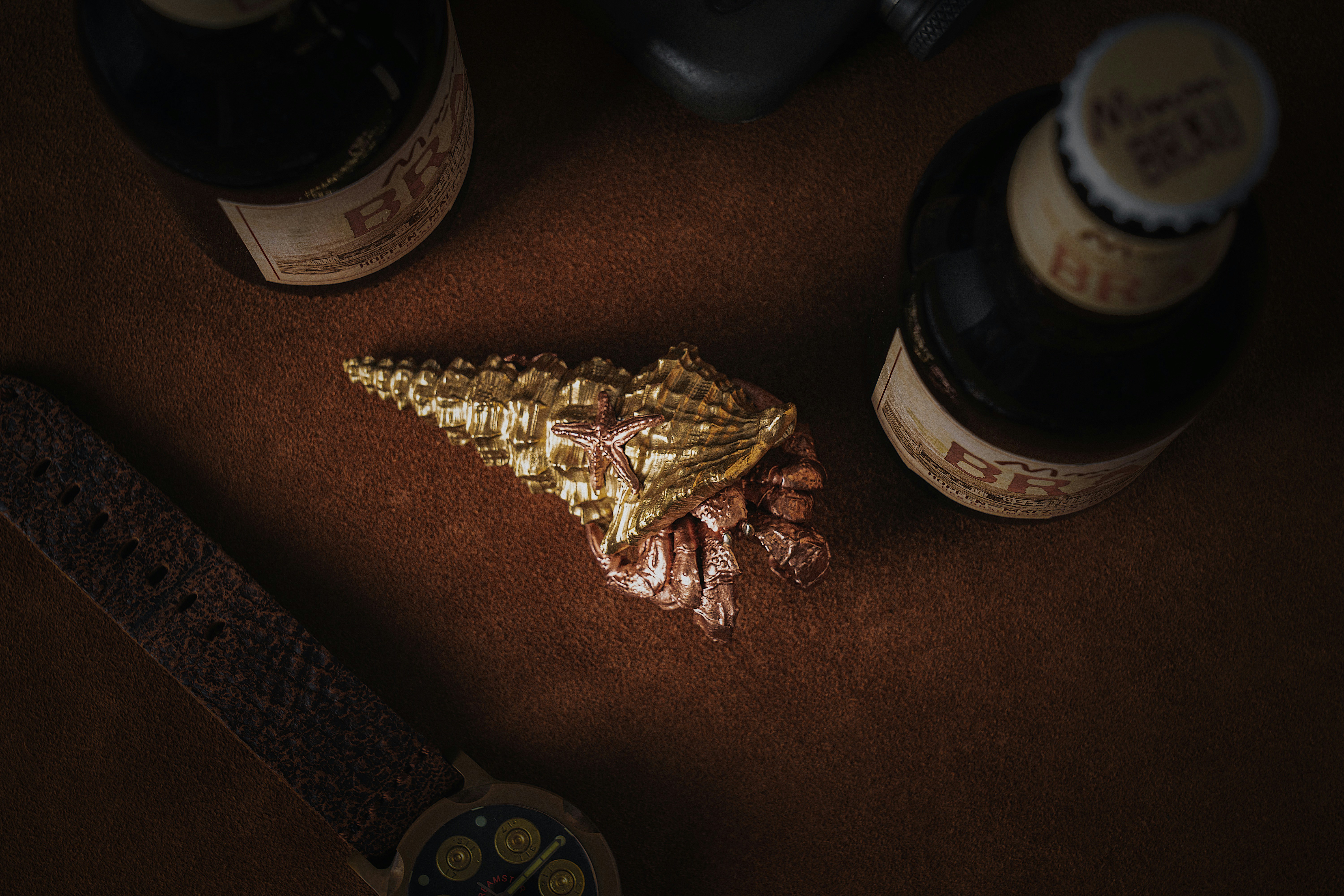 Amber-Glow Gold Cluster Between Bottles and Time