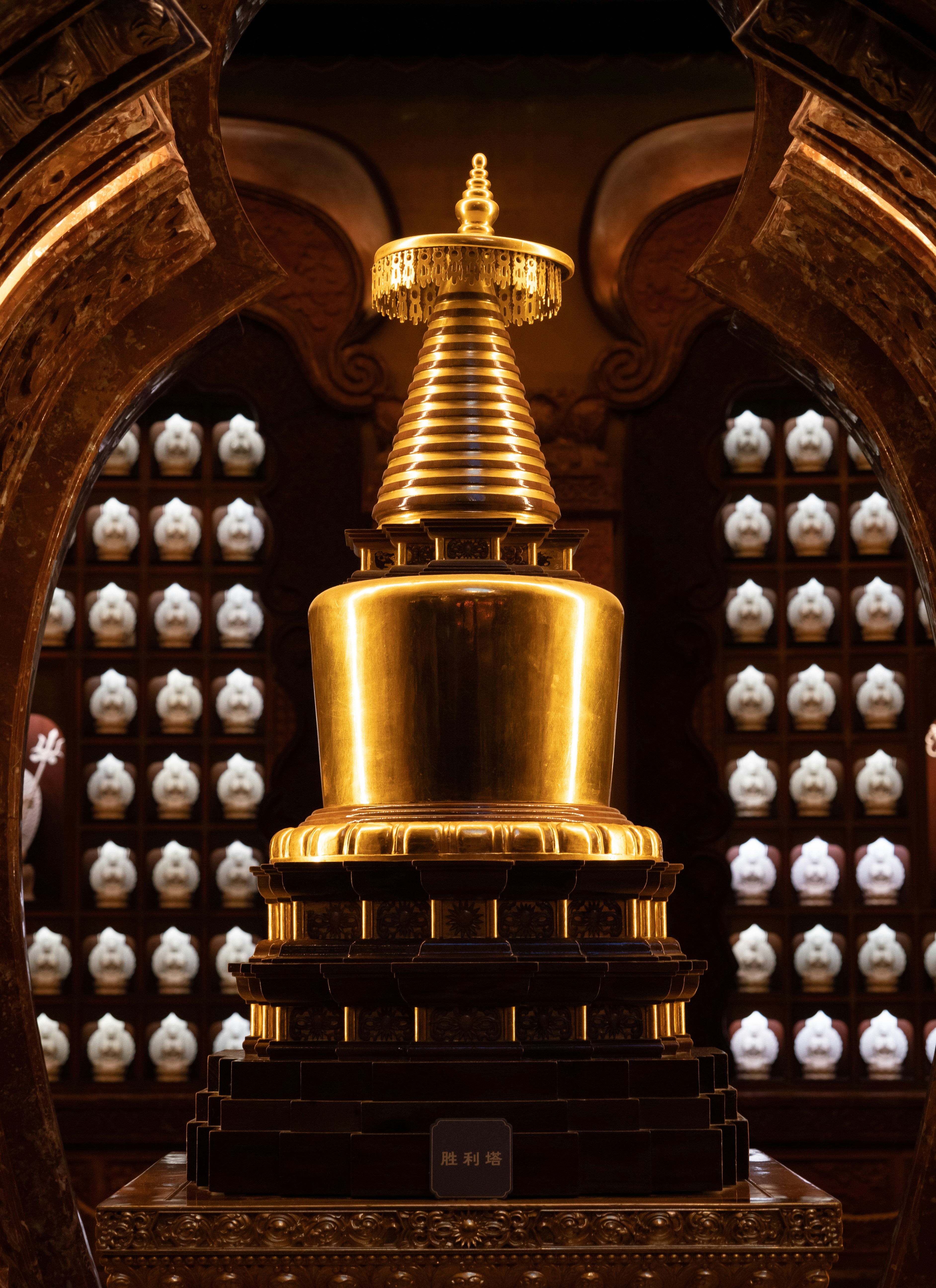 A large golden object sitting in a room photo – Free Festival Image on ...