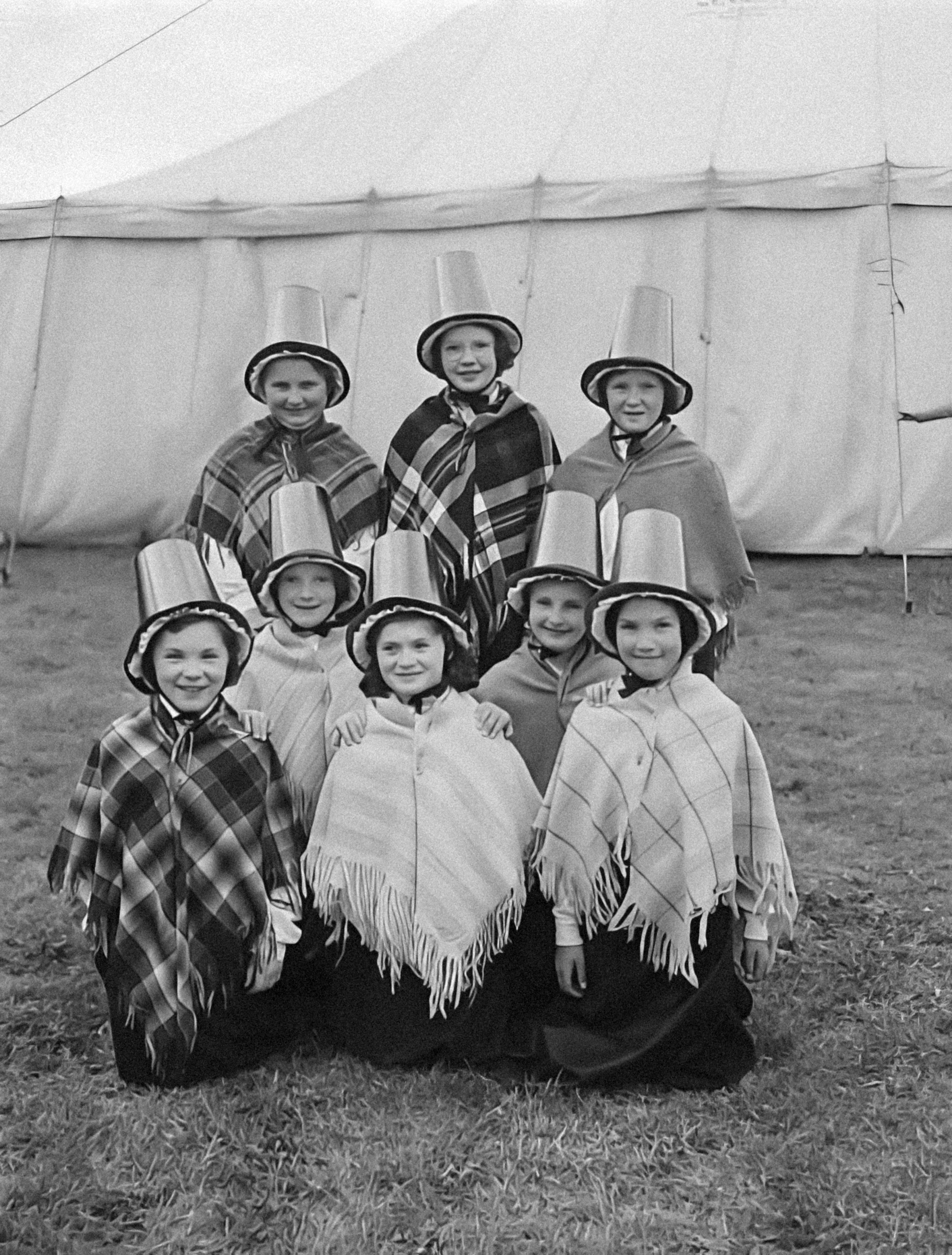 A group of children wearing hats and scarves photo – Free Children ...