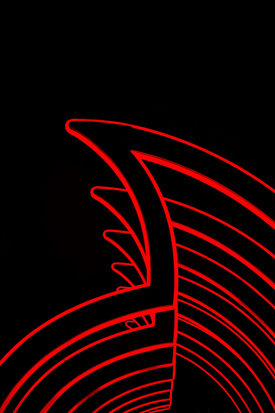 Abstract red neon-like curved lines sweeping across a black background, forming layered arcs and sharp angles.