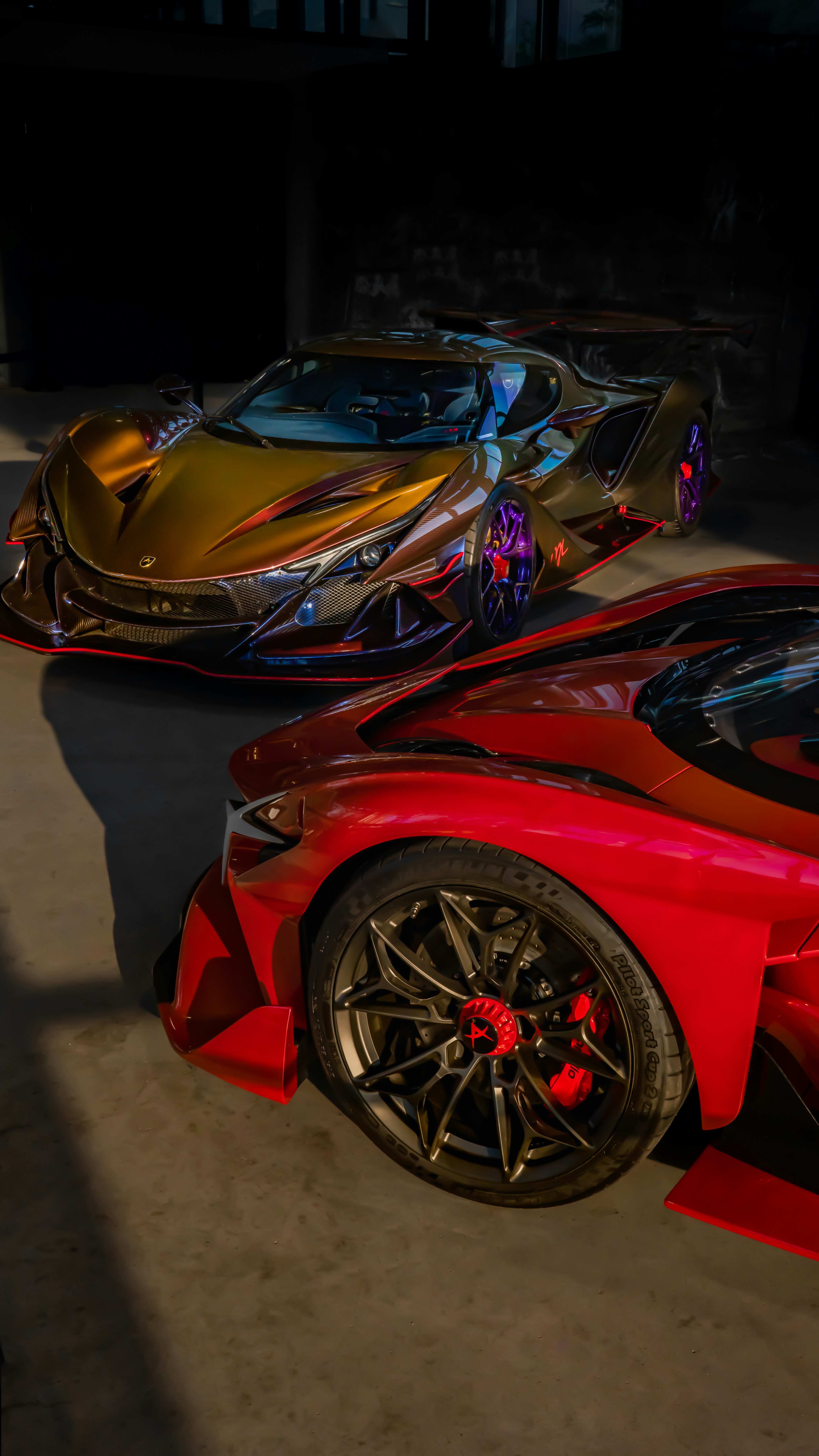 A couple of cars parked next to each other photo – Free Motorworld ...