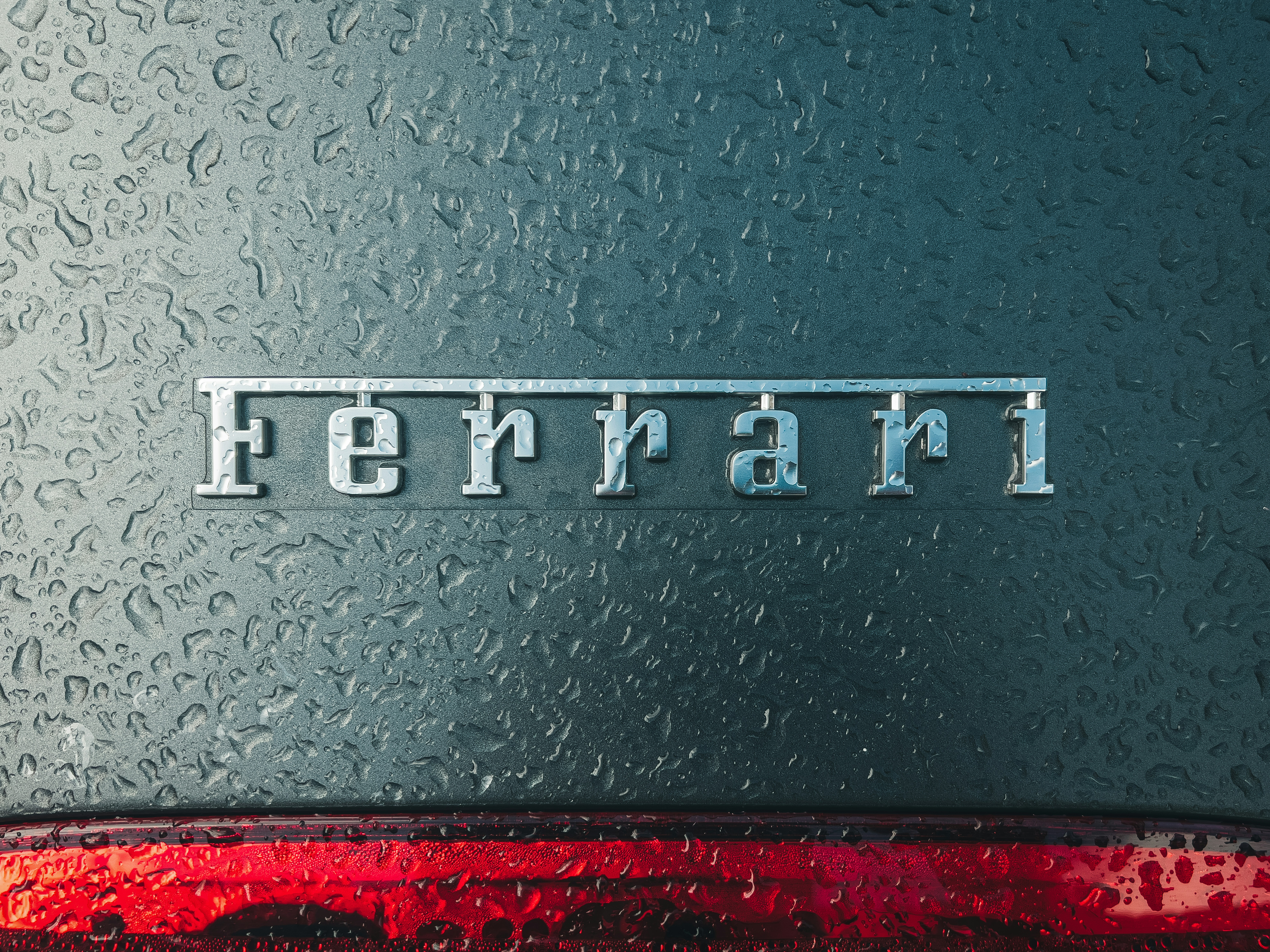 A close up of the word ferrari on the side of a car photo – Free Oxford ...