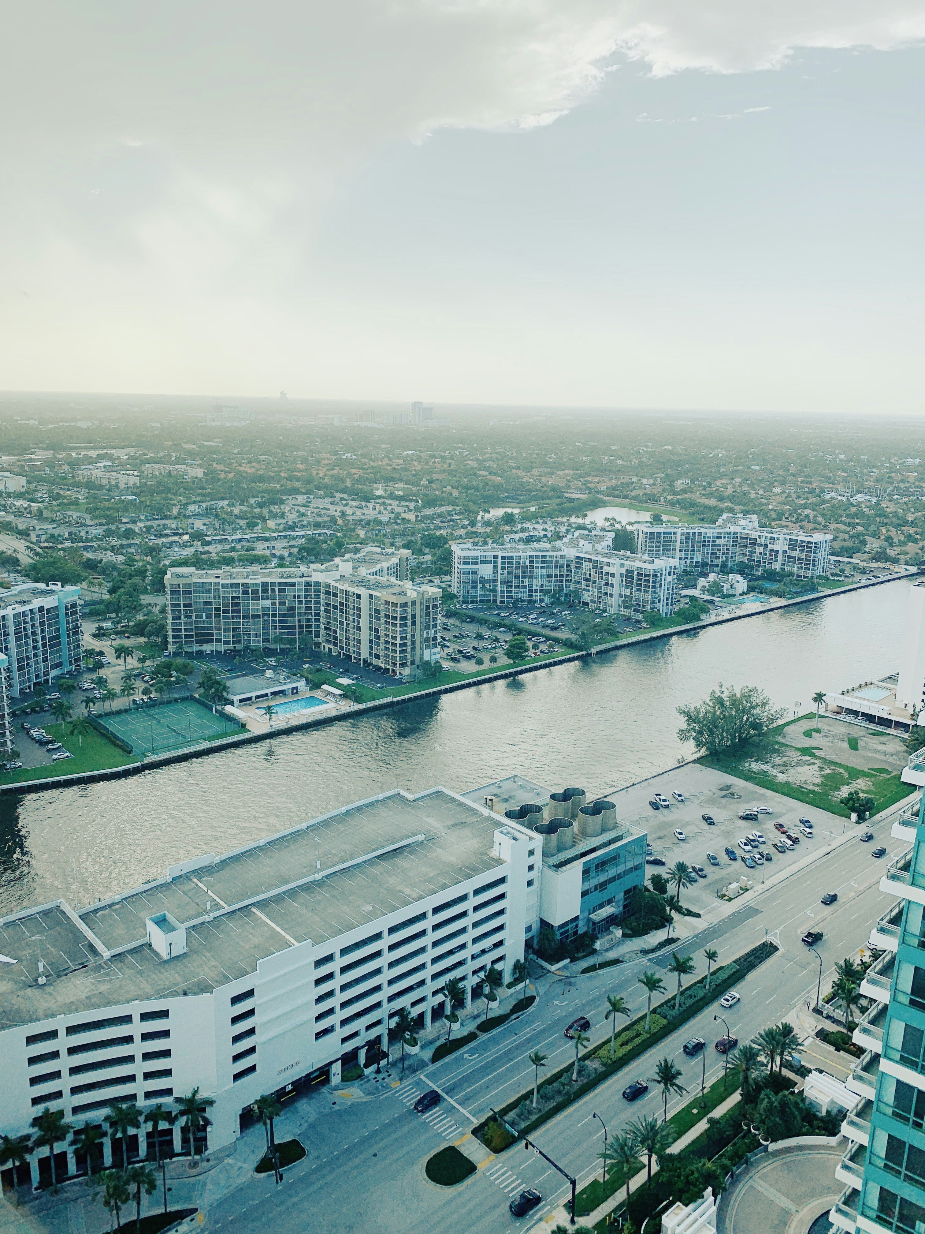 an aerial view of a city with a river running through it