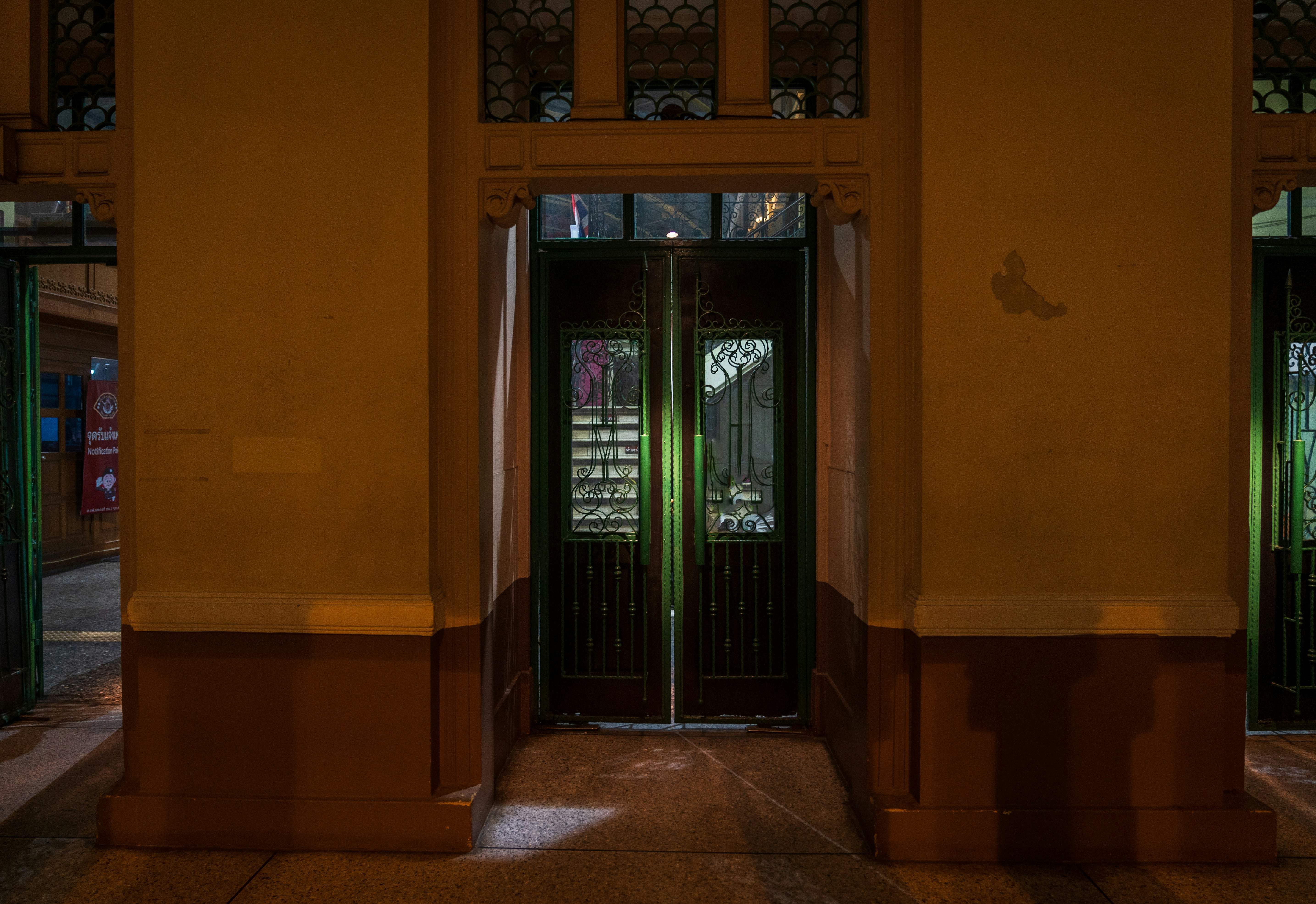 Emerald Gateways in Amber Architecture: A Quiet Transit Hall Portrait