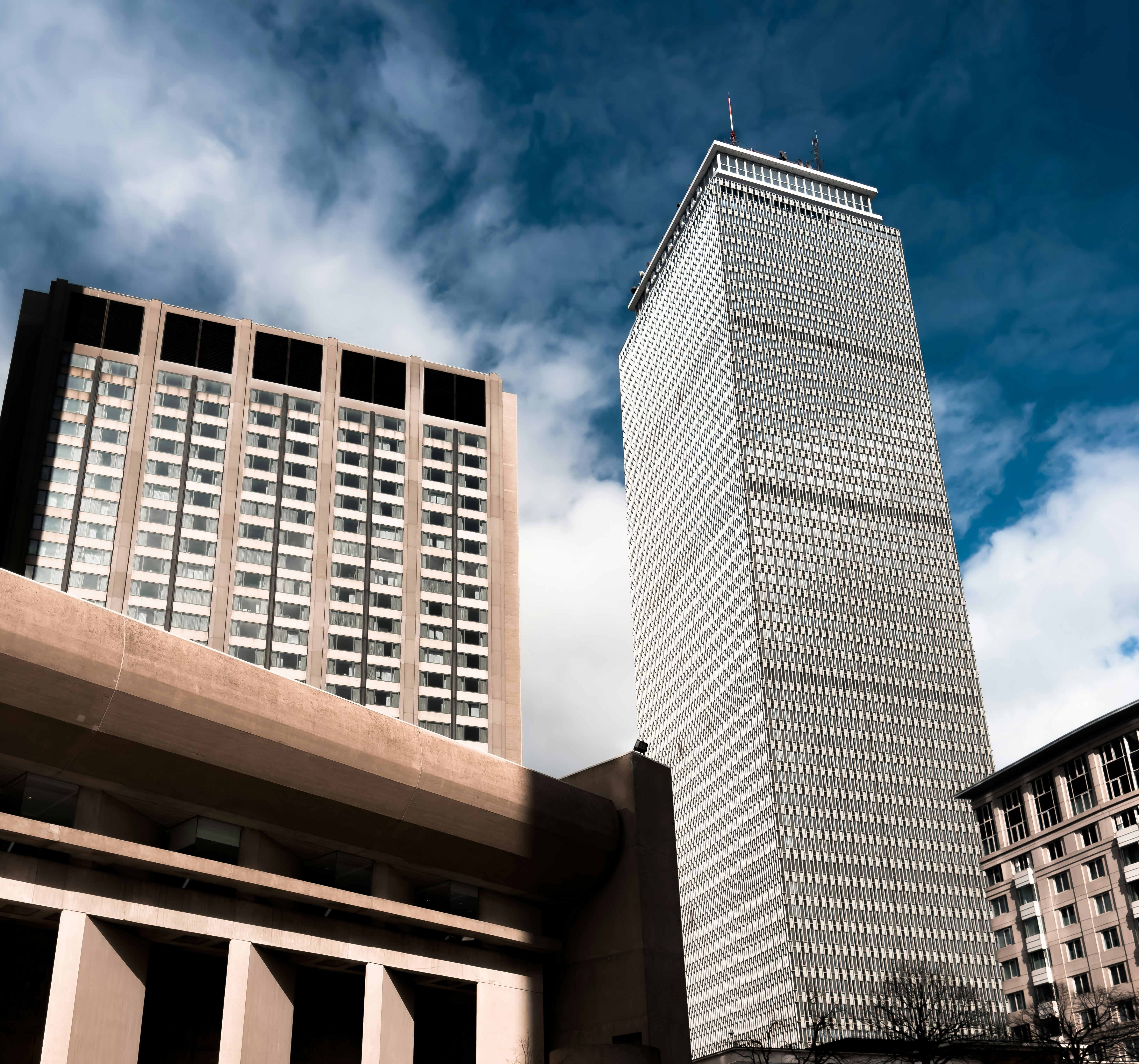 A very tall building next to a very tall building photo – Free Boston ...