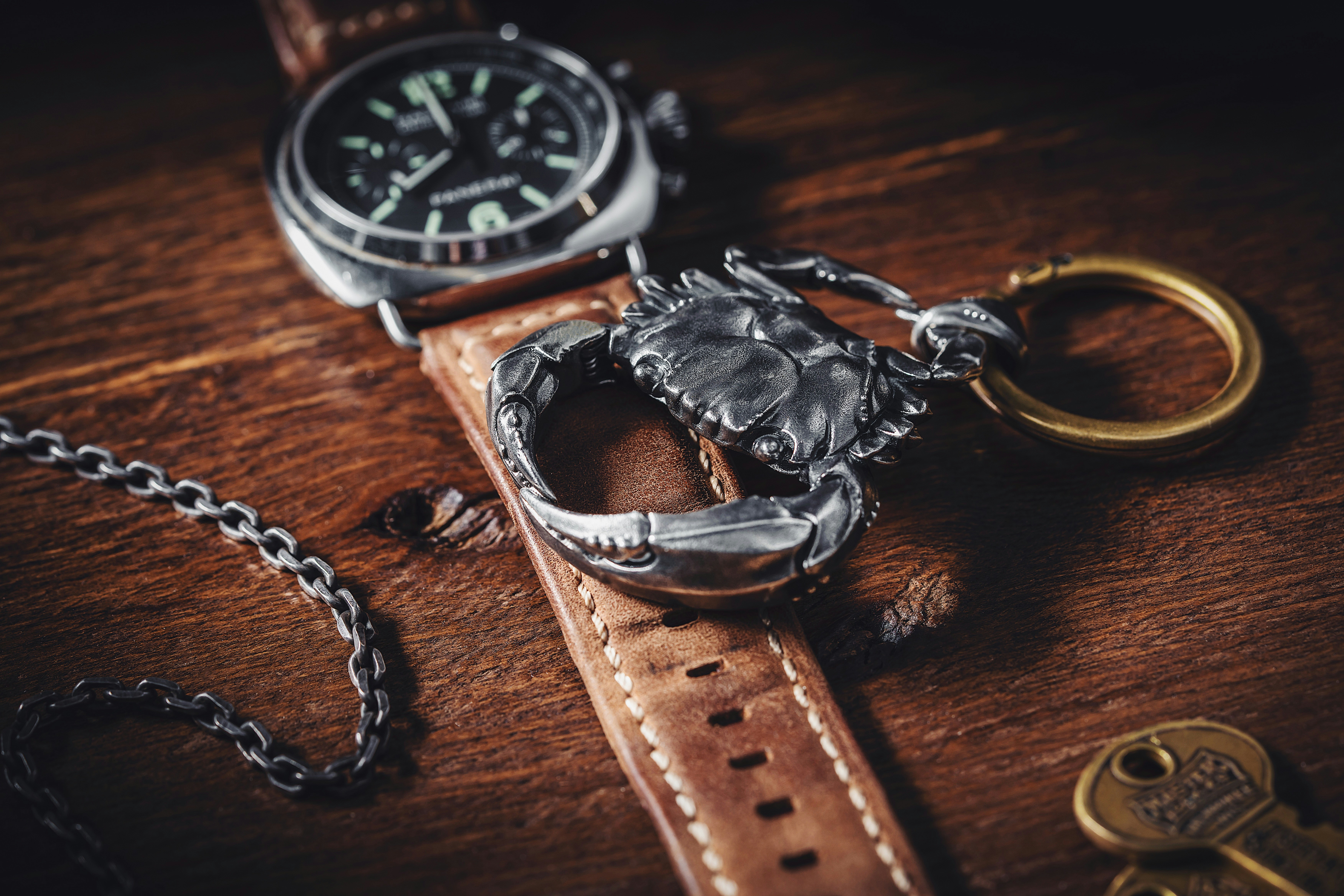 A watch sitting on top of a wooden table photo – Free Accessories Image ...