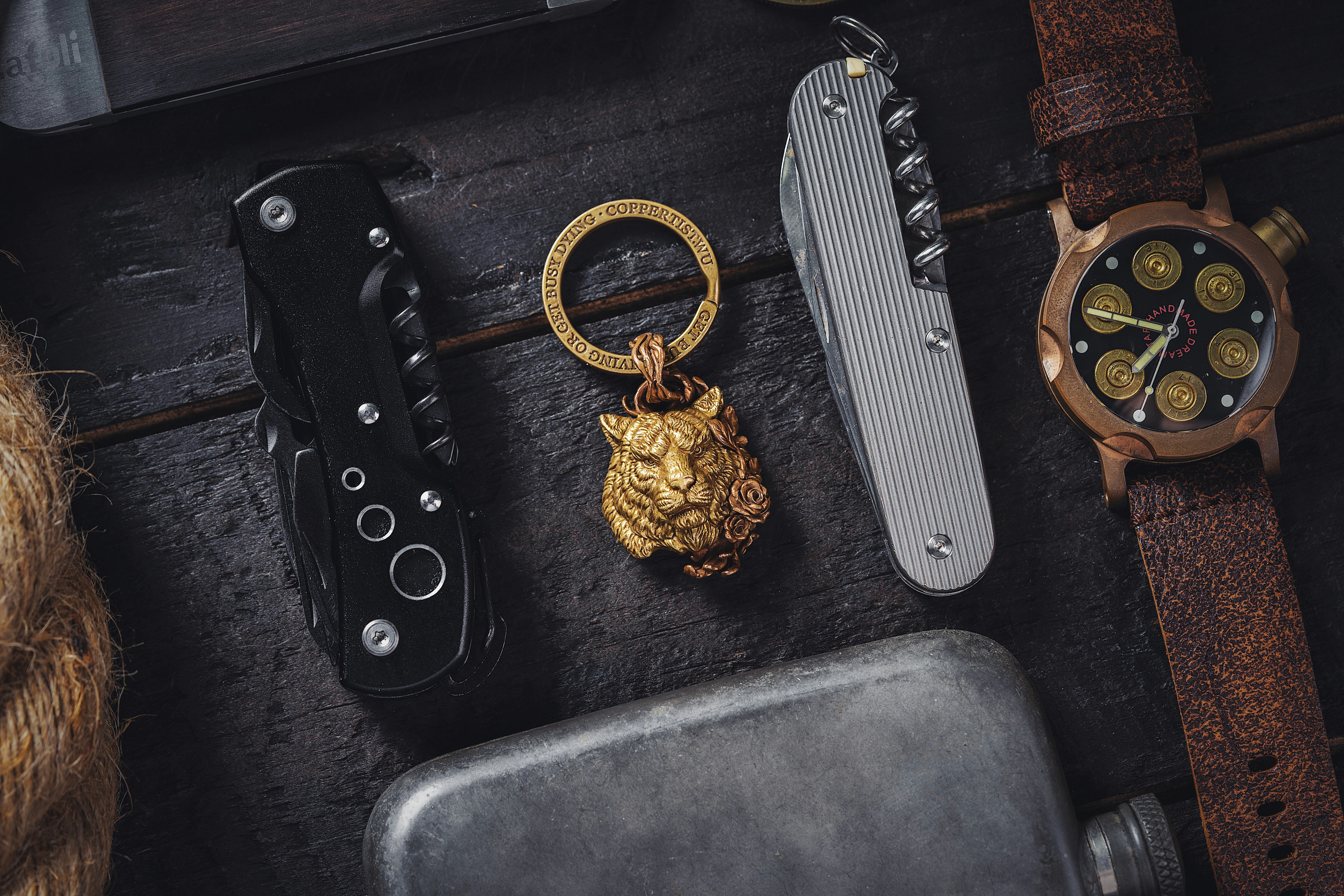 The Lion's Keepsake: A Quiet Still-Life of Tools and Trinkets