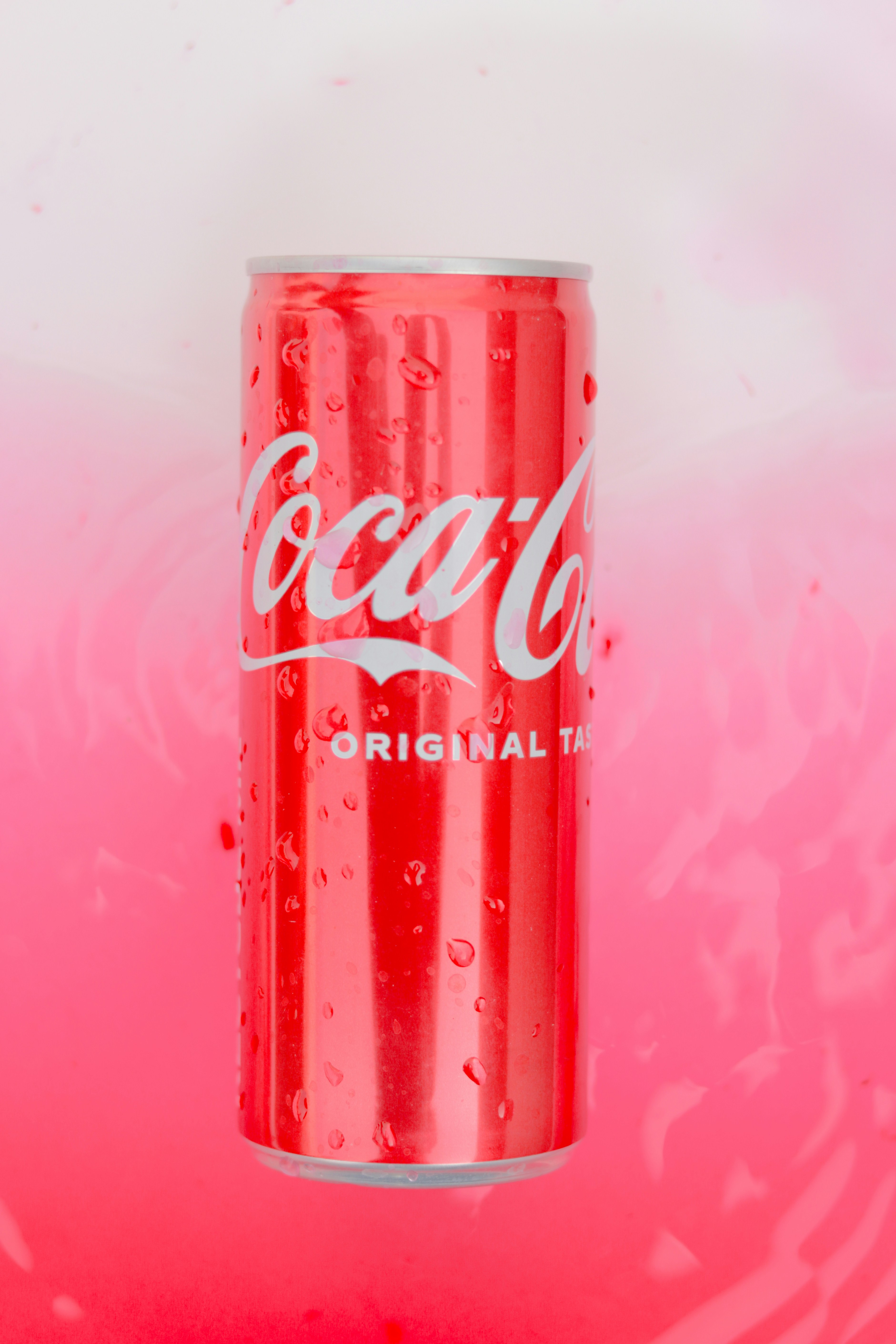 A can of coca - cola on a pink background photo – Free Beverage Image ...