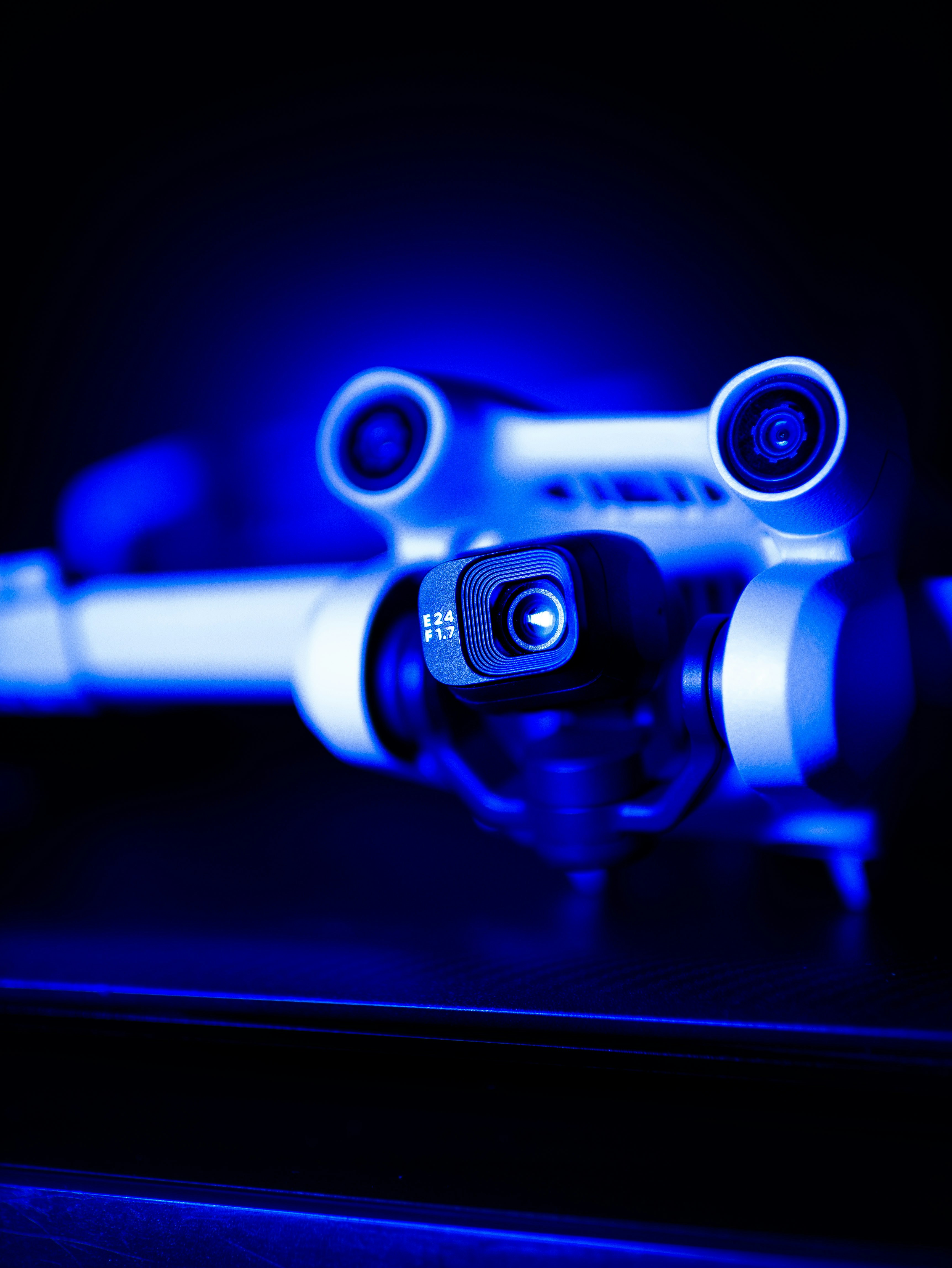 Cobalt Gimbal Glow: A Close-Up on a Compact Drone Camera