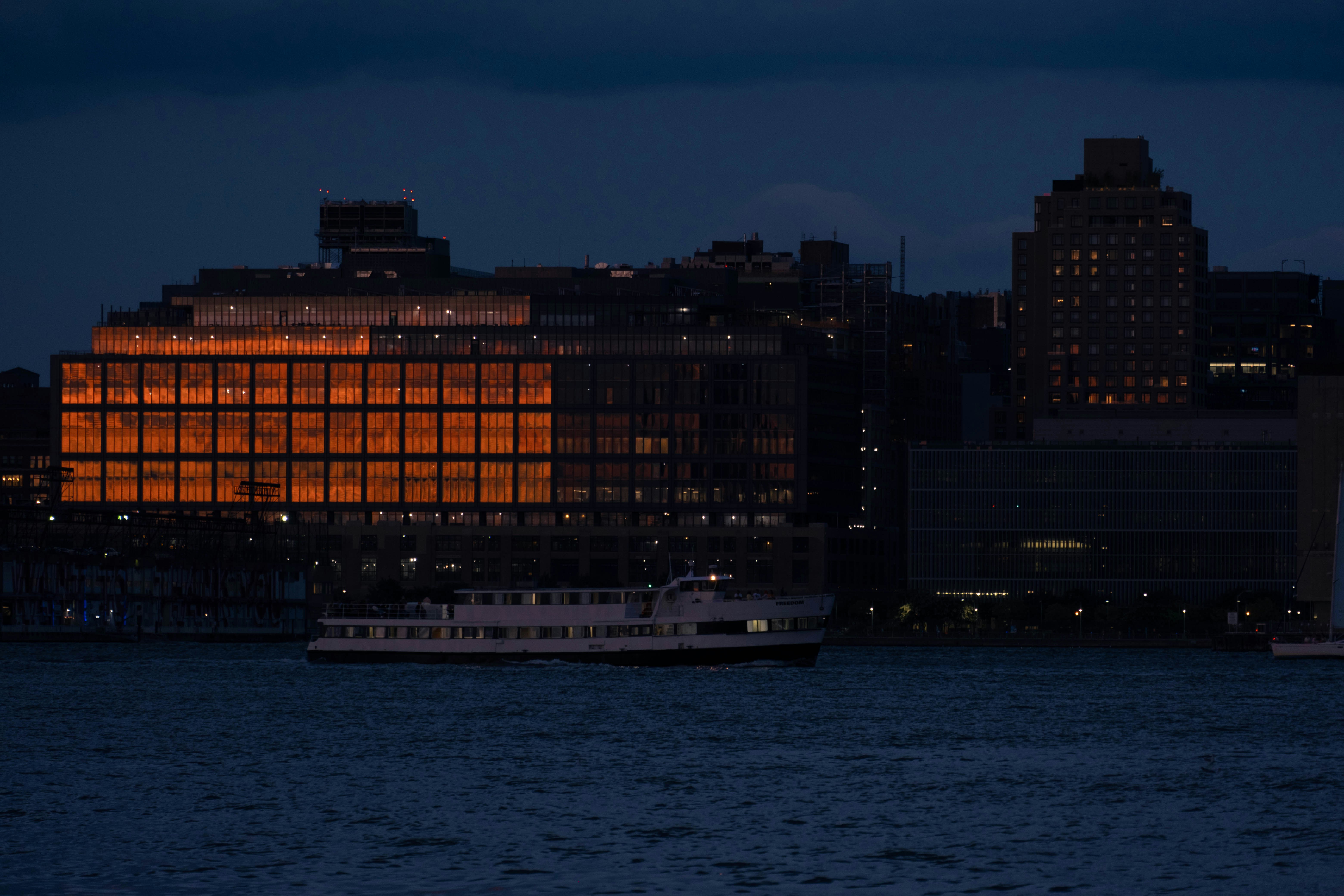 Amber Grid at Dusk: A Waterfront Cityscape