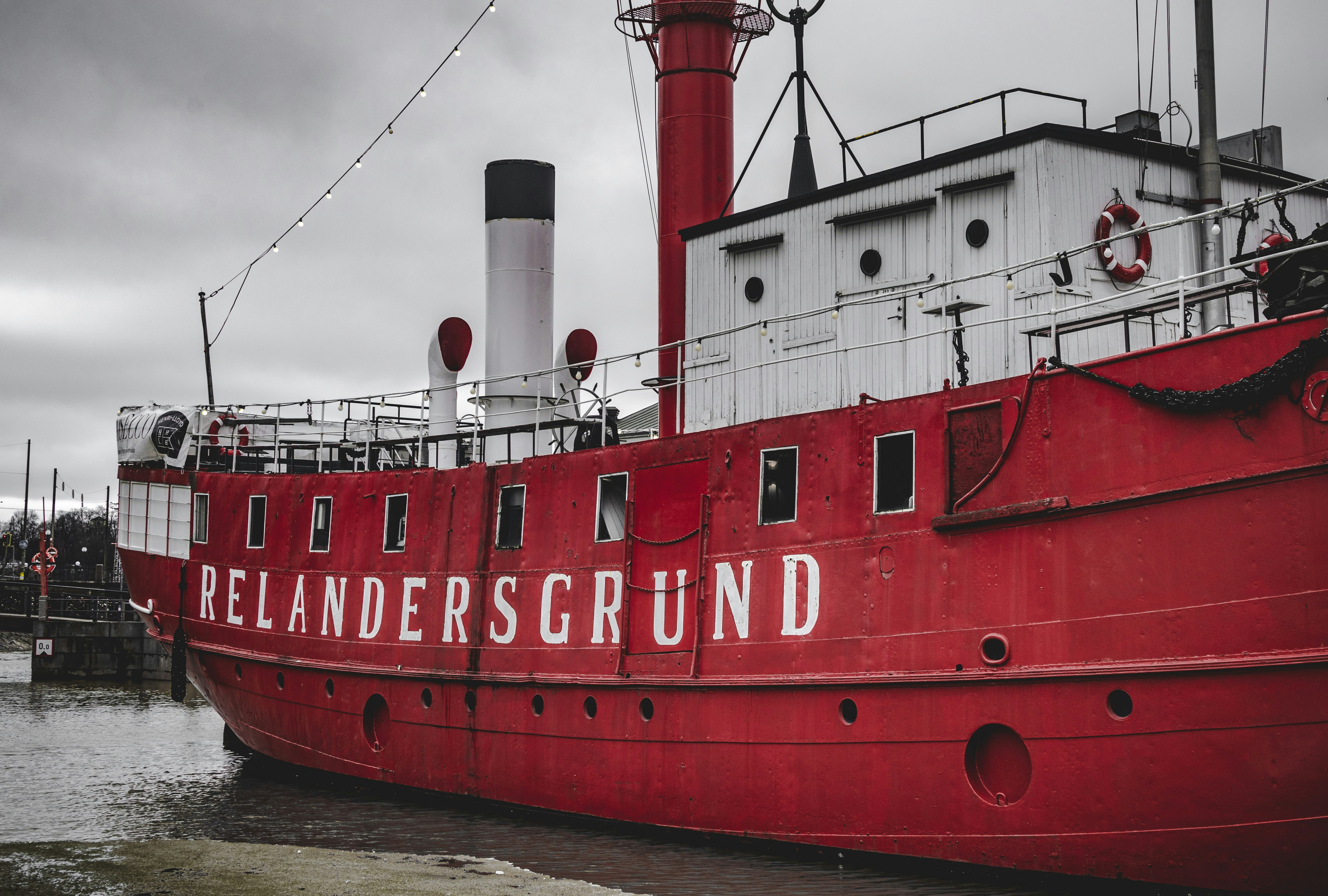 Crimson Hull at Quiet Harbour: Relandersgrund Resting by the Docks