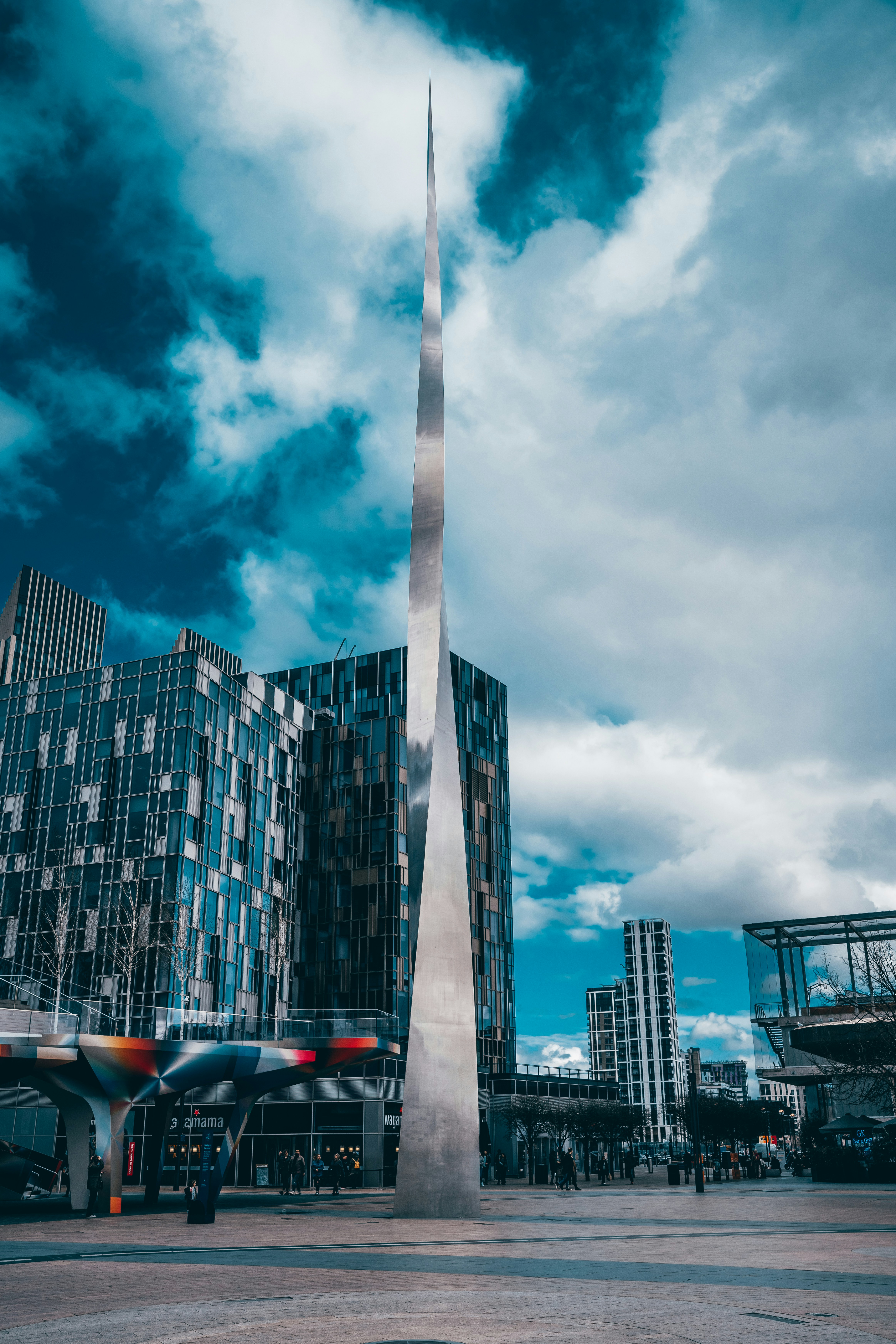 The City's Quiet Needle: Steel Spire Amid Glass Horizons
