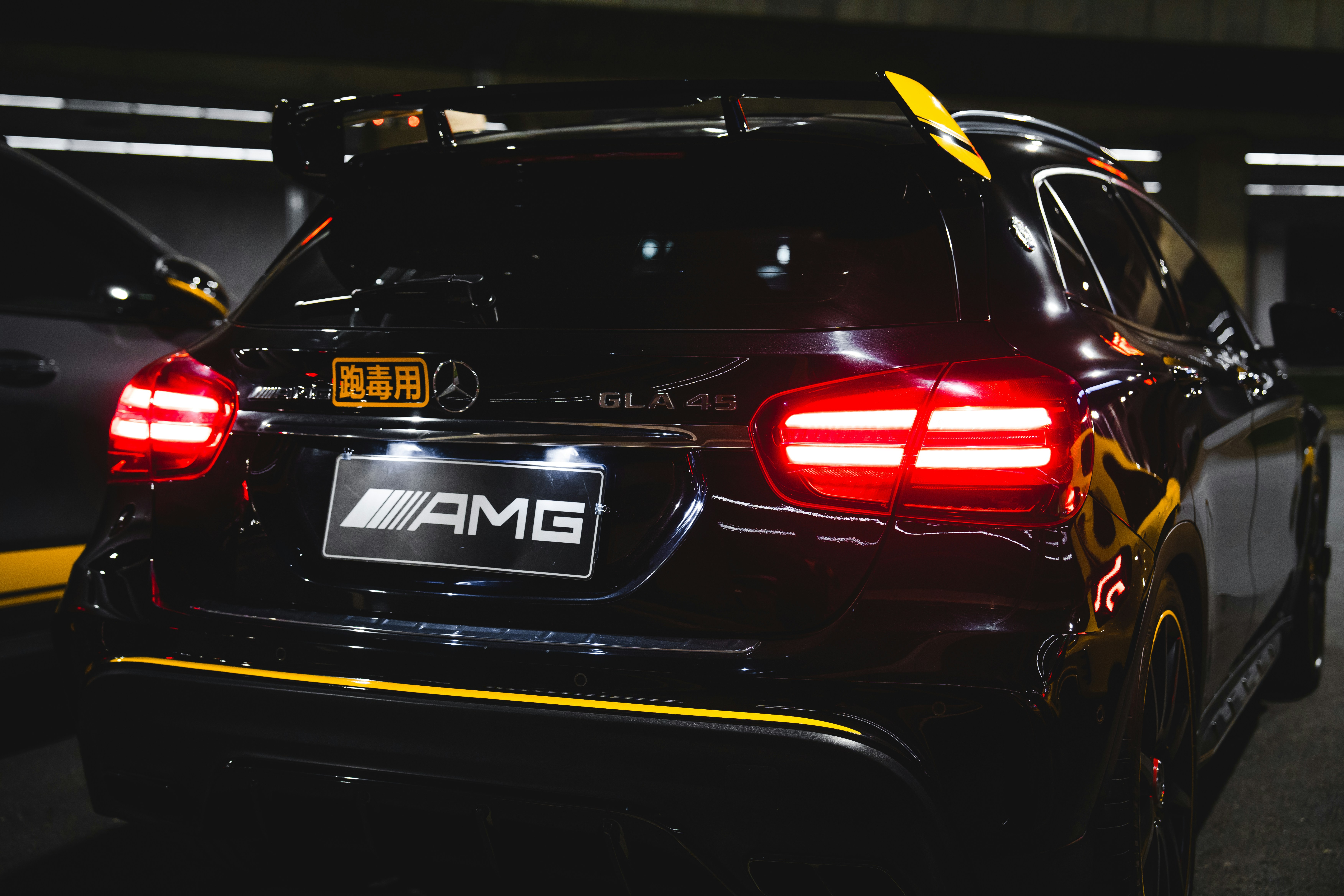 Neon Rear Glow: Mercedes-AMG in a Dim Parking Garage