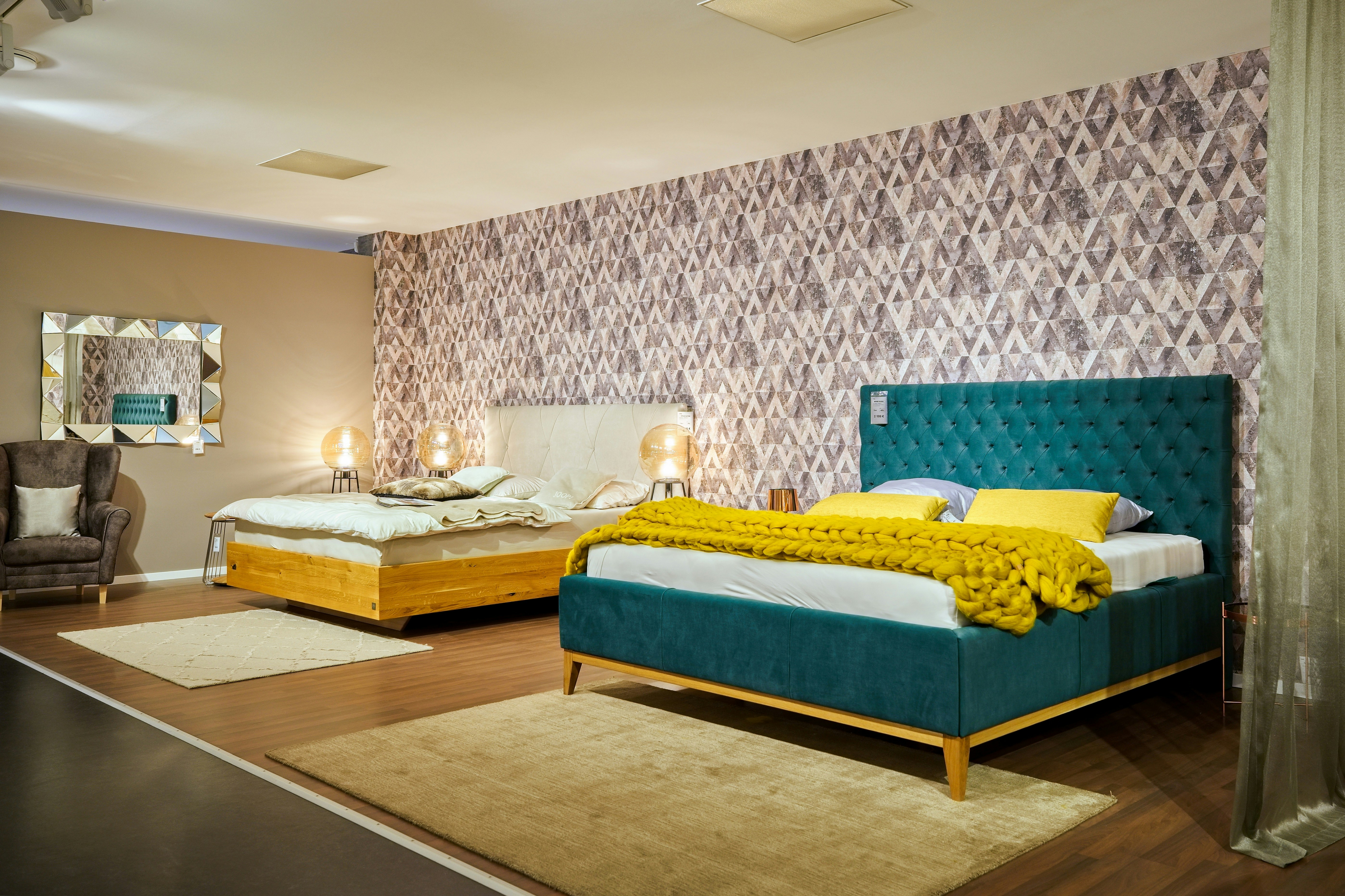 A bed room with a neatly made bed and a chair photo – Free Bosákova 5 ...