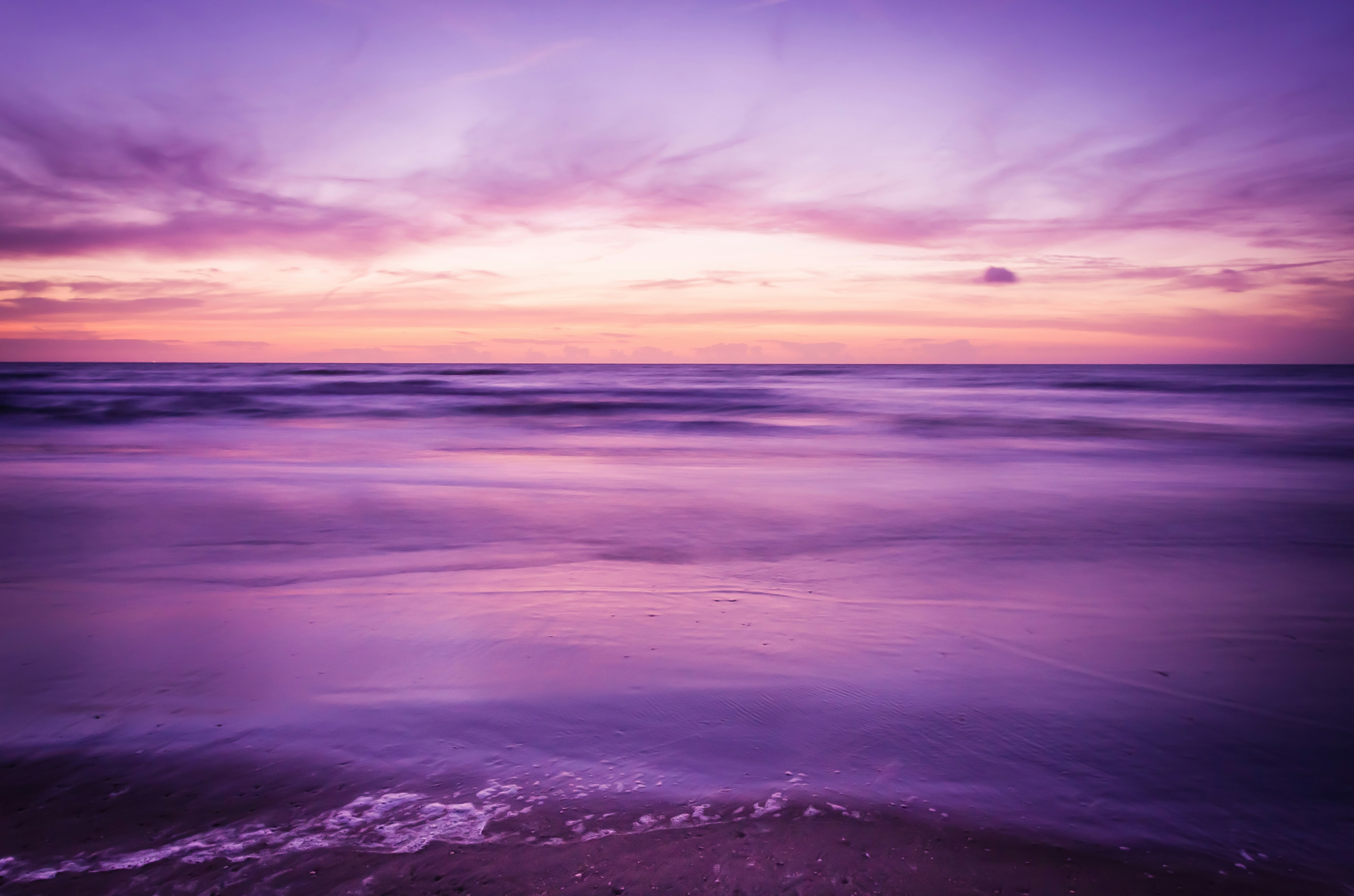 A purple and pink sunset over the ocean photo – Free Beach Image on ...