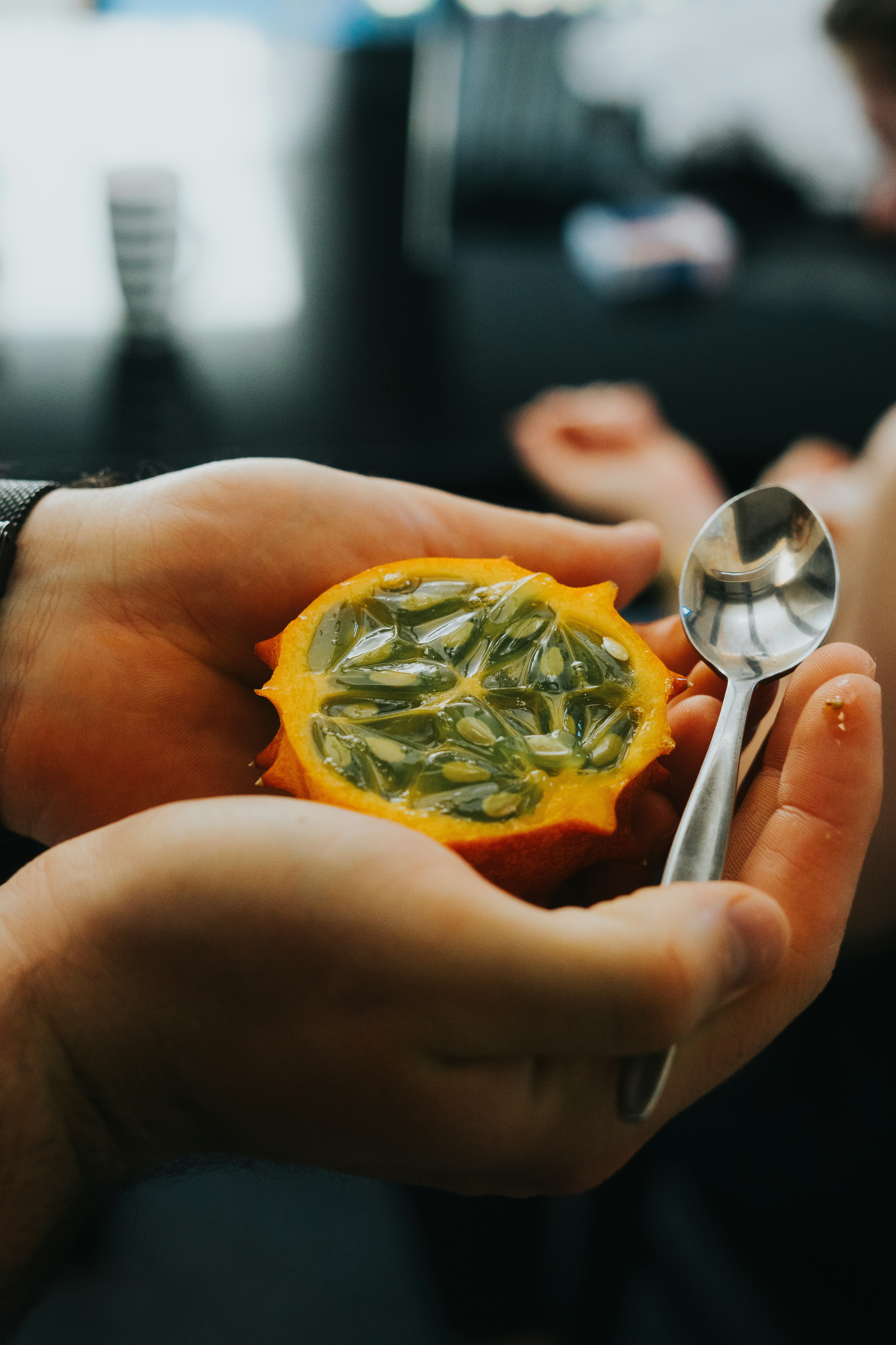 Cradled Citrus: A Quiet Moment with Gelled Orange and a Spoon