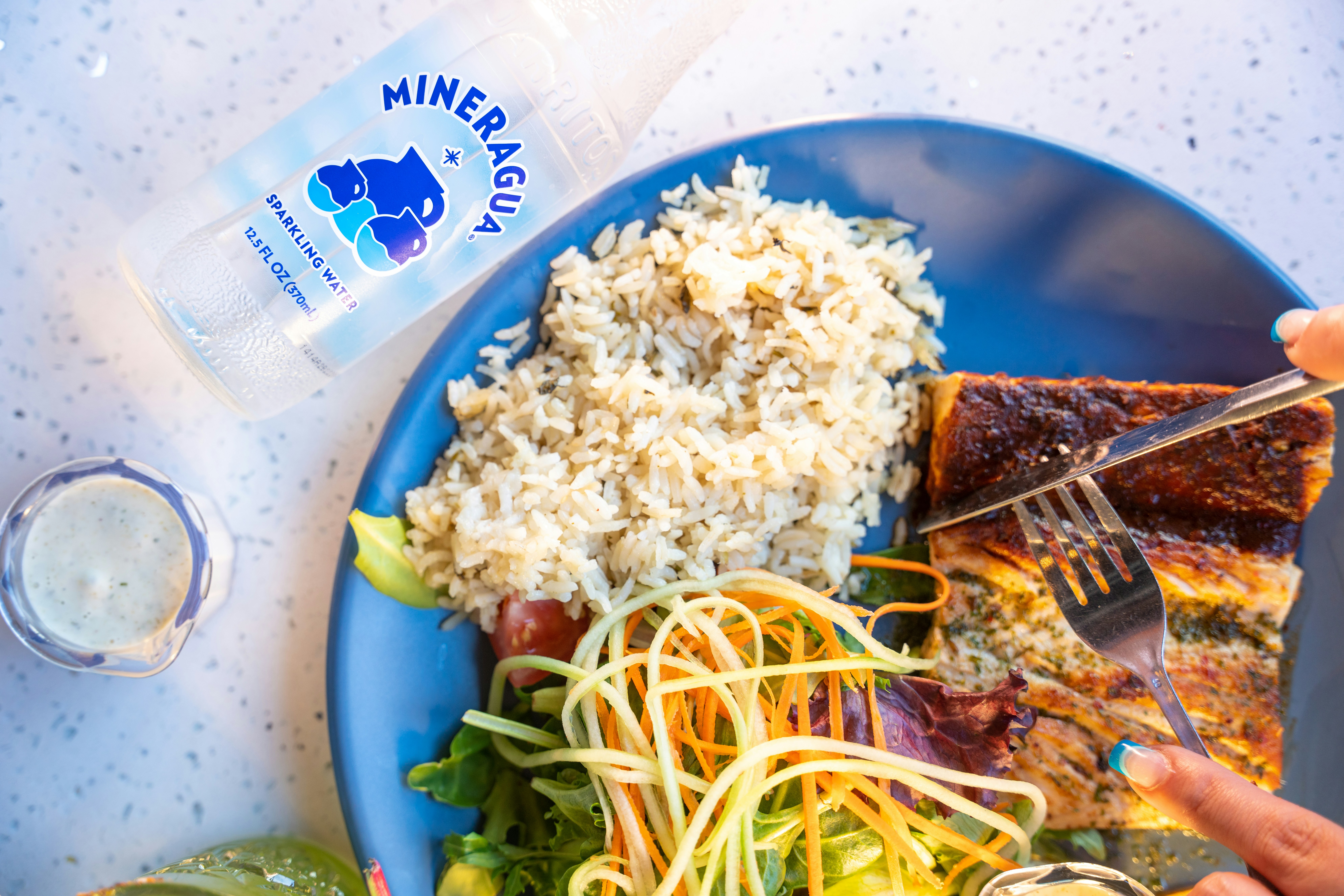 Blue Plate Ritual: A Slice of Glazed Delight Amid Greens and Rice