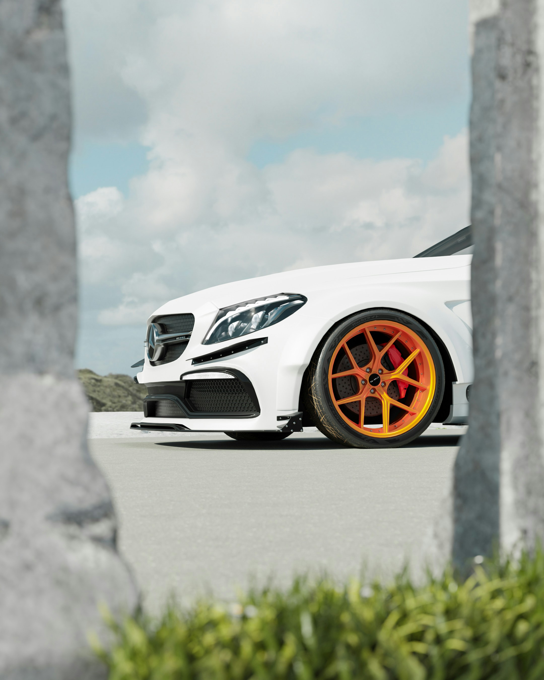 A white car with orange rims parked in a parking lot photo – Free Wheel ...
