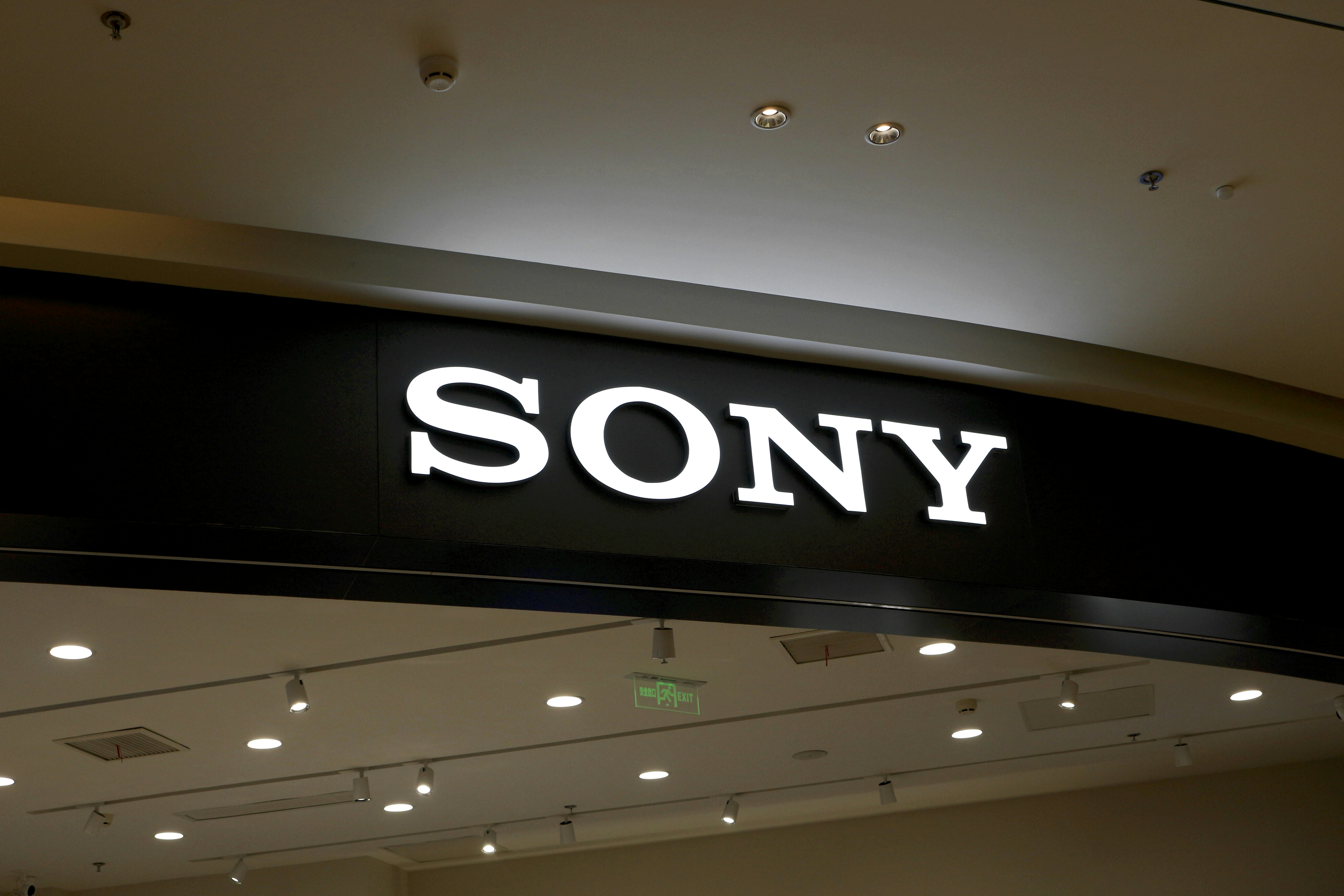 A sony store sign hanging from the ceiling photo – Free Sony Image on ...