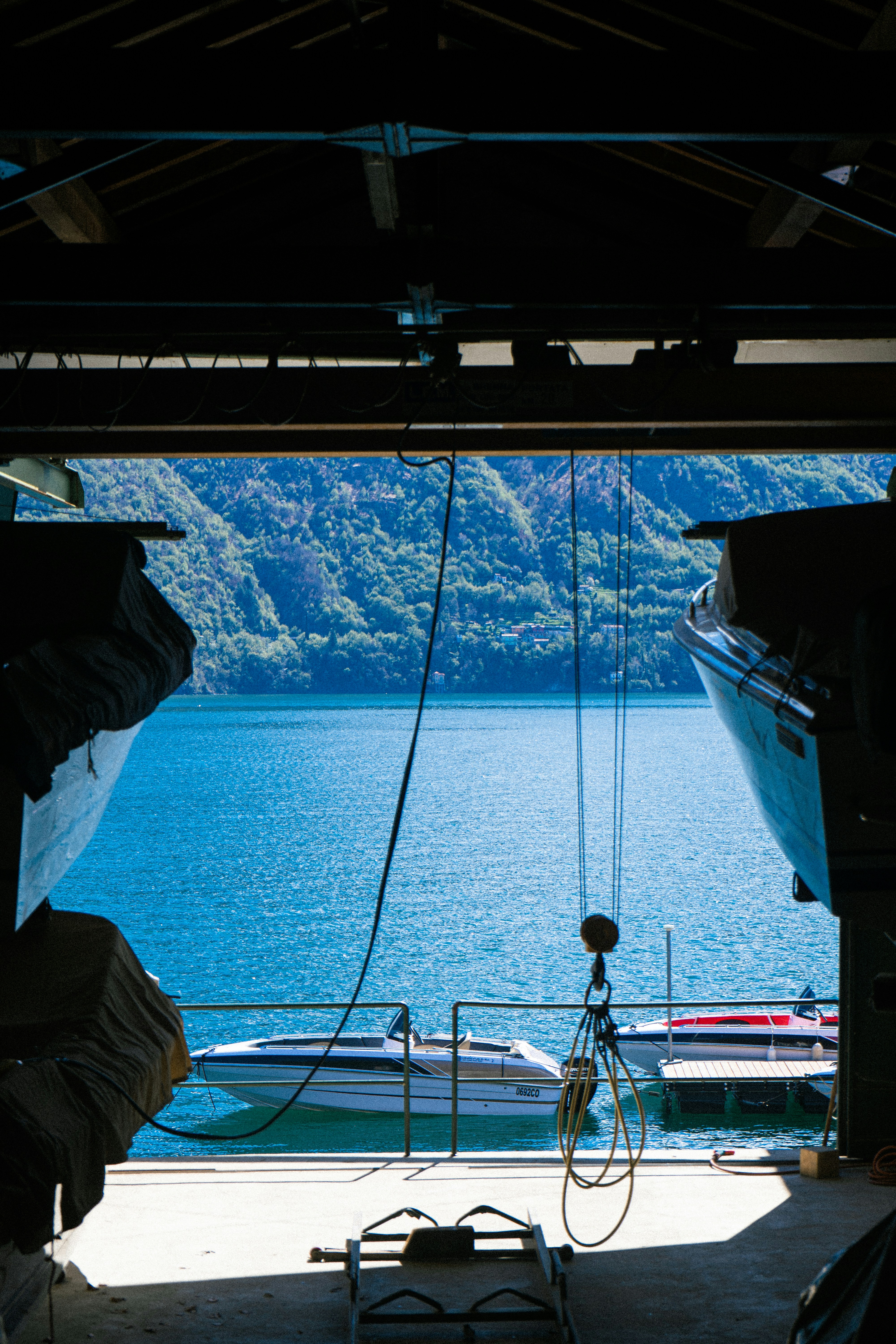 a boat is docked in the water near a dock