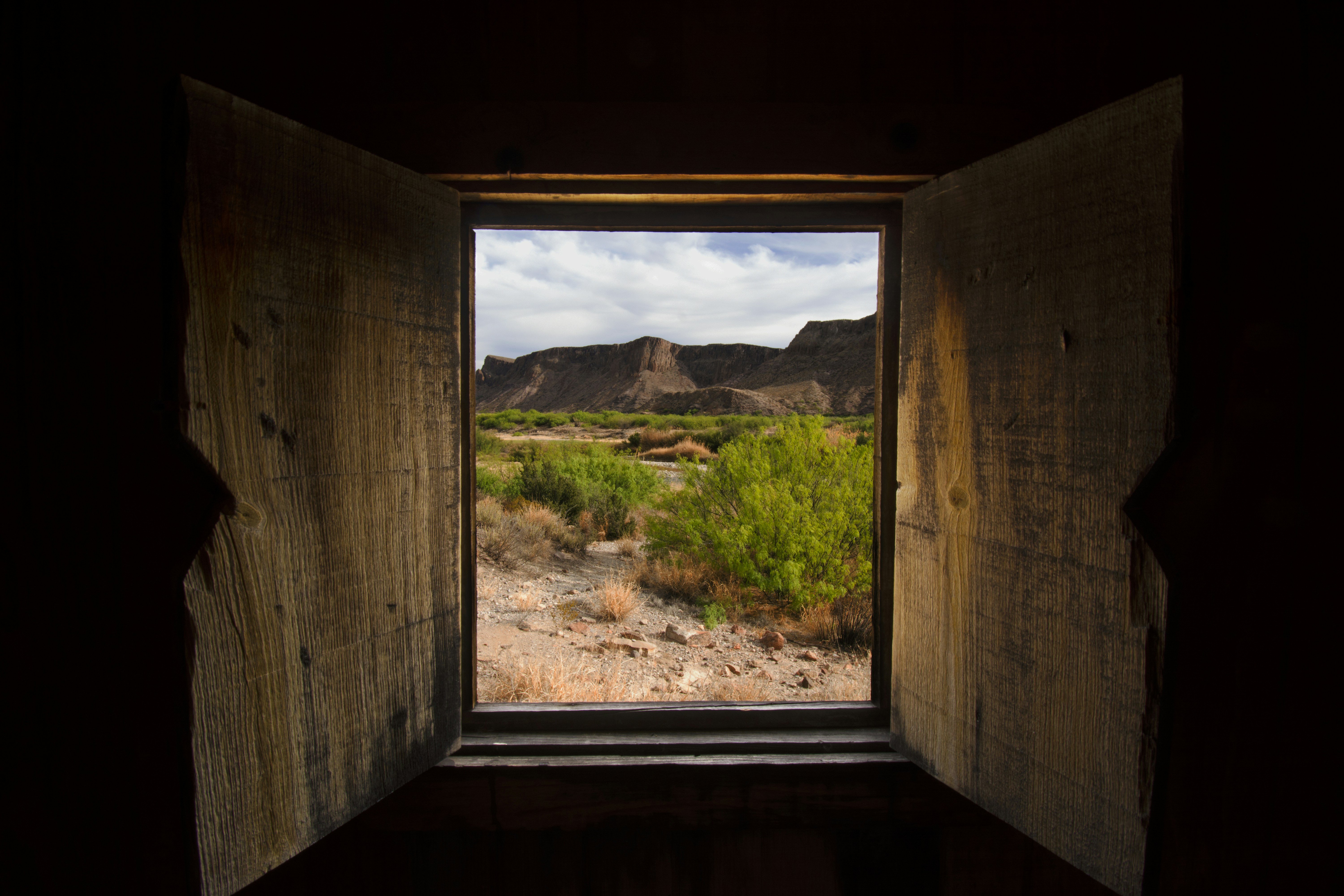 An open window with a view of a desert photo – Free Window Image on ...
