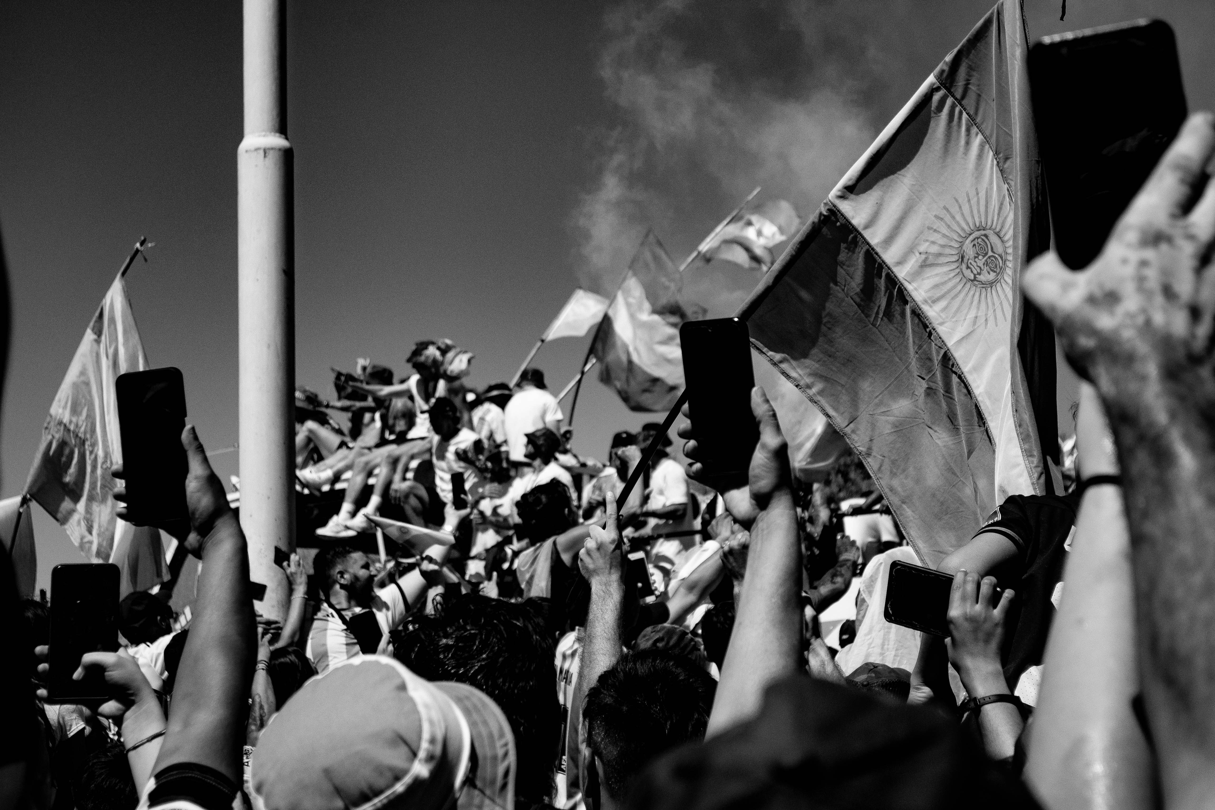 A crowd of people holding up their cell phones photo – Free Woman Image ...