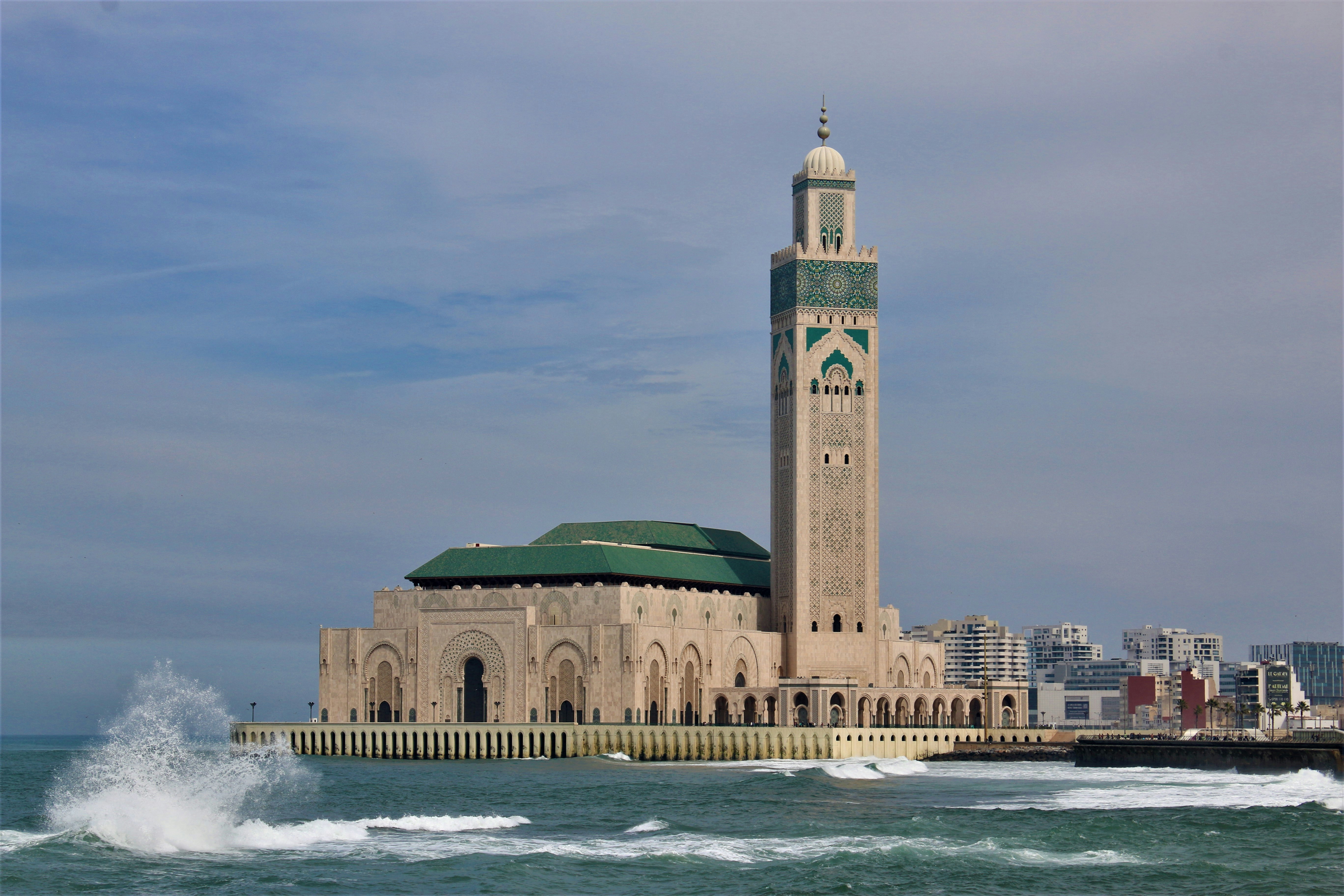 Sea-Front Minaret: Moorish Mosque Reaching Over Ocean Waves