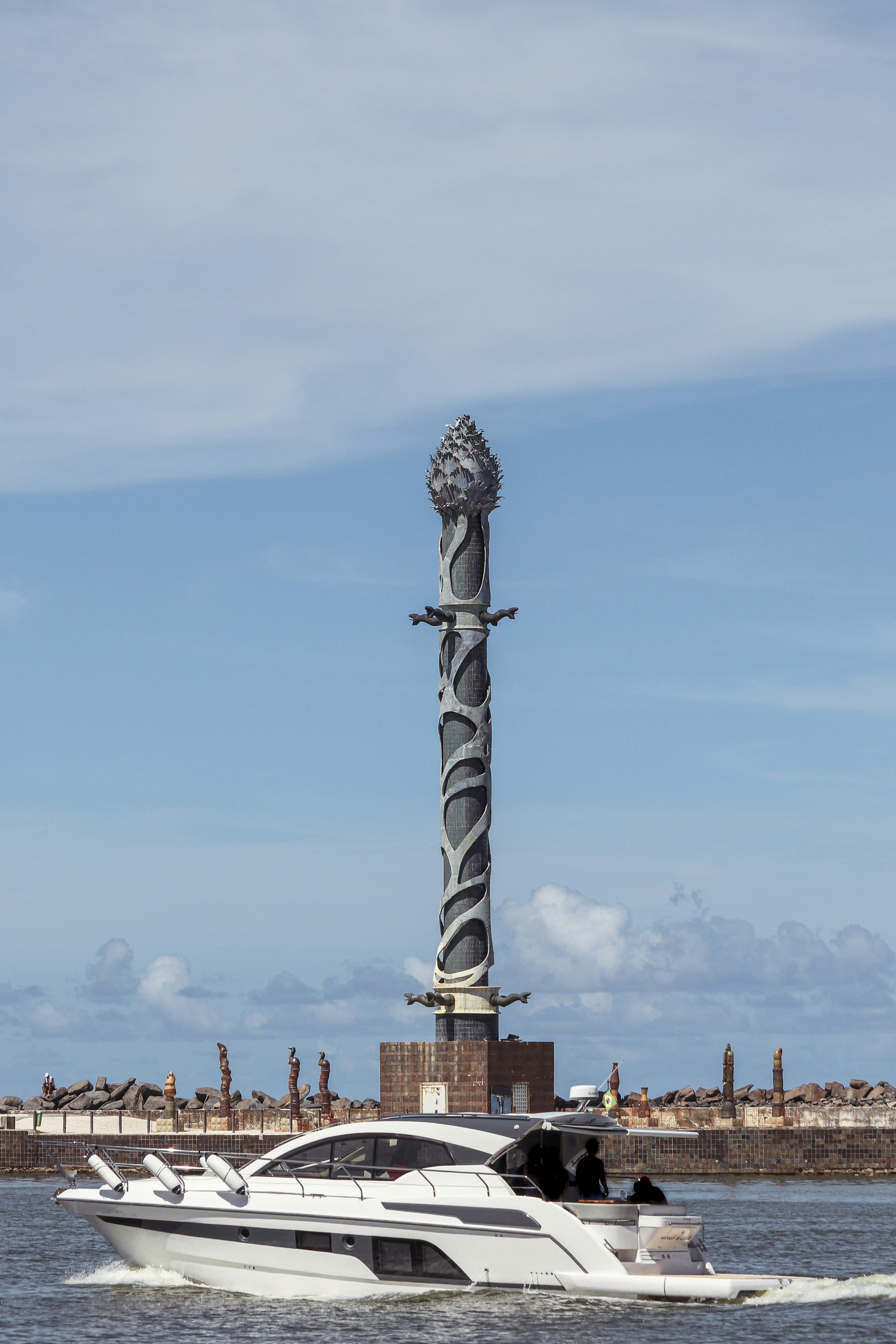Winged Column over Calm Waters