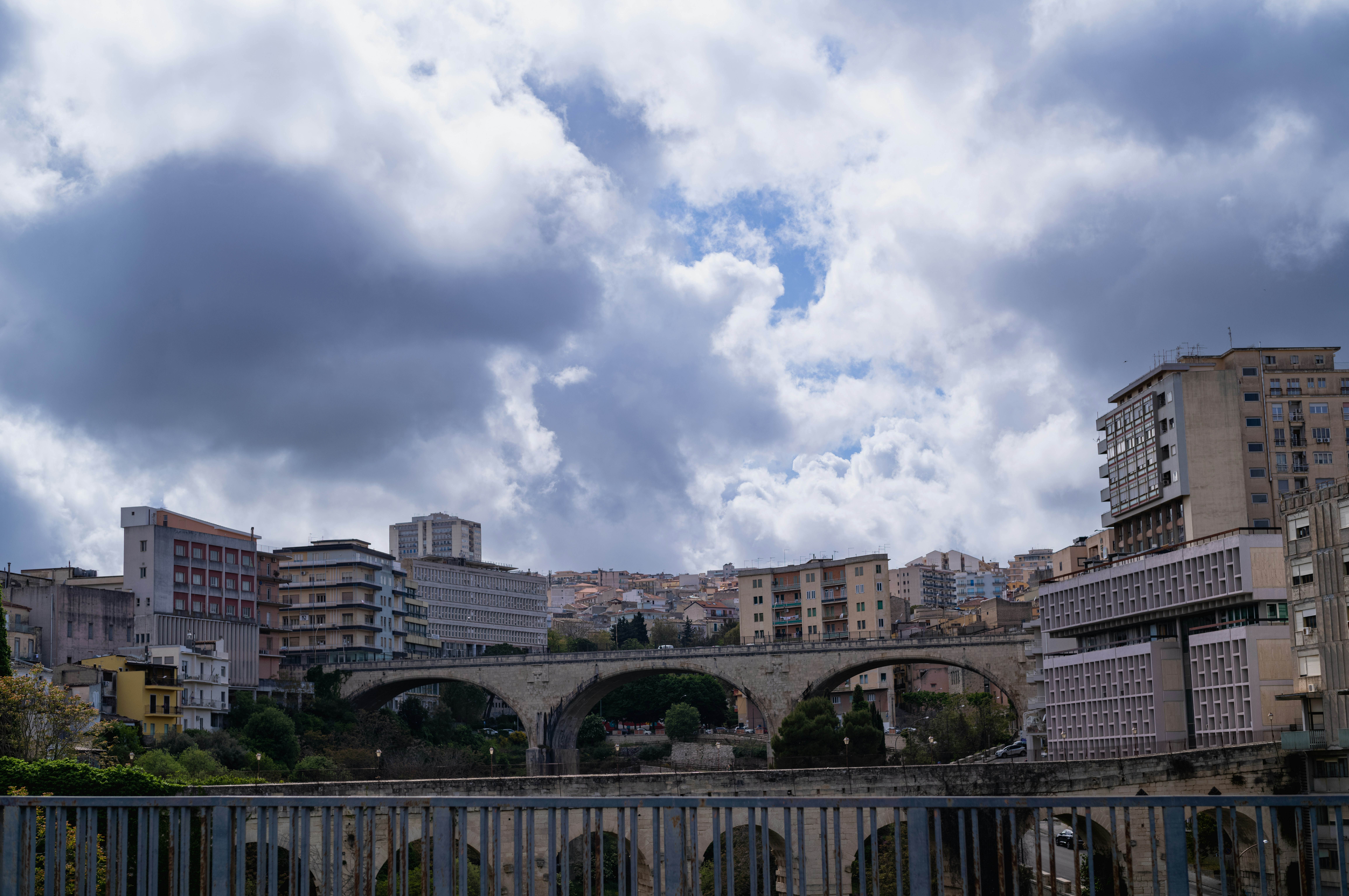Arched Elegance Amidst Urban Heights