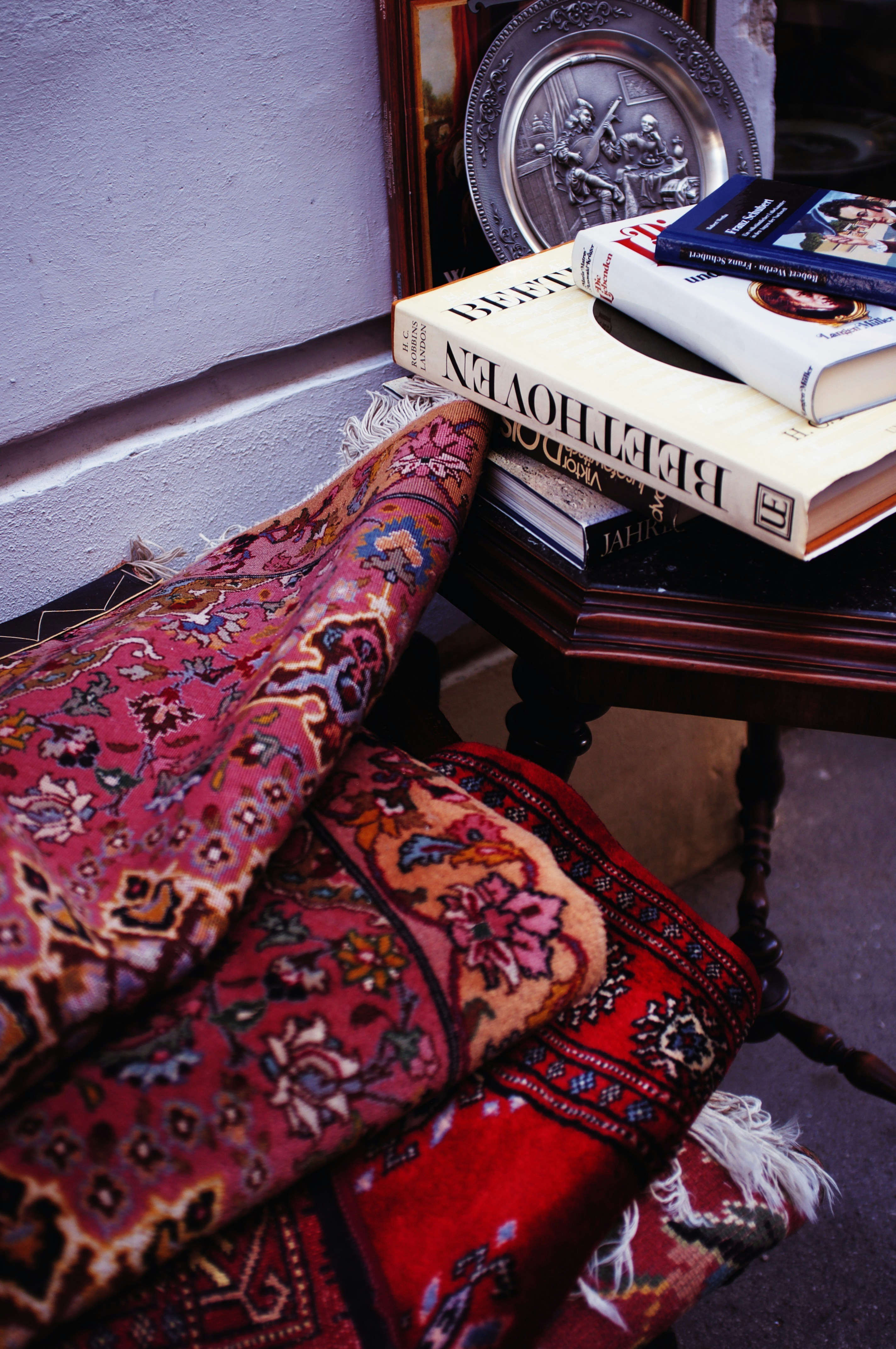 a pile of books sitting on top of a table