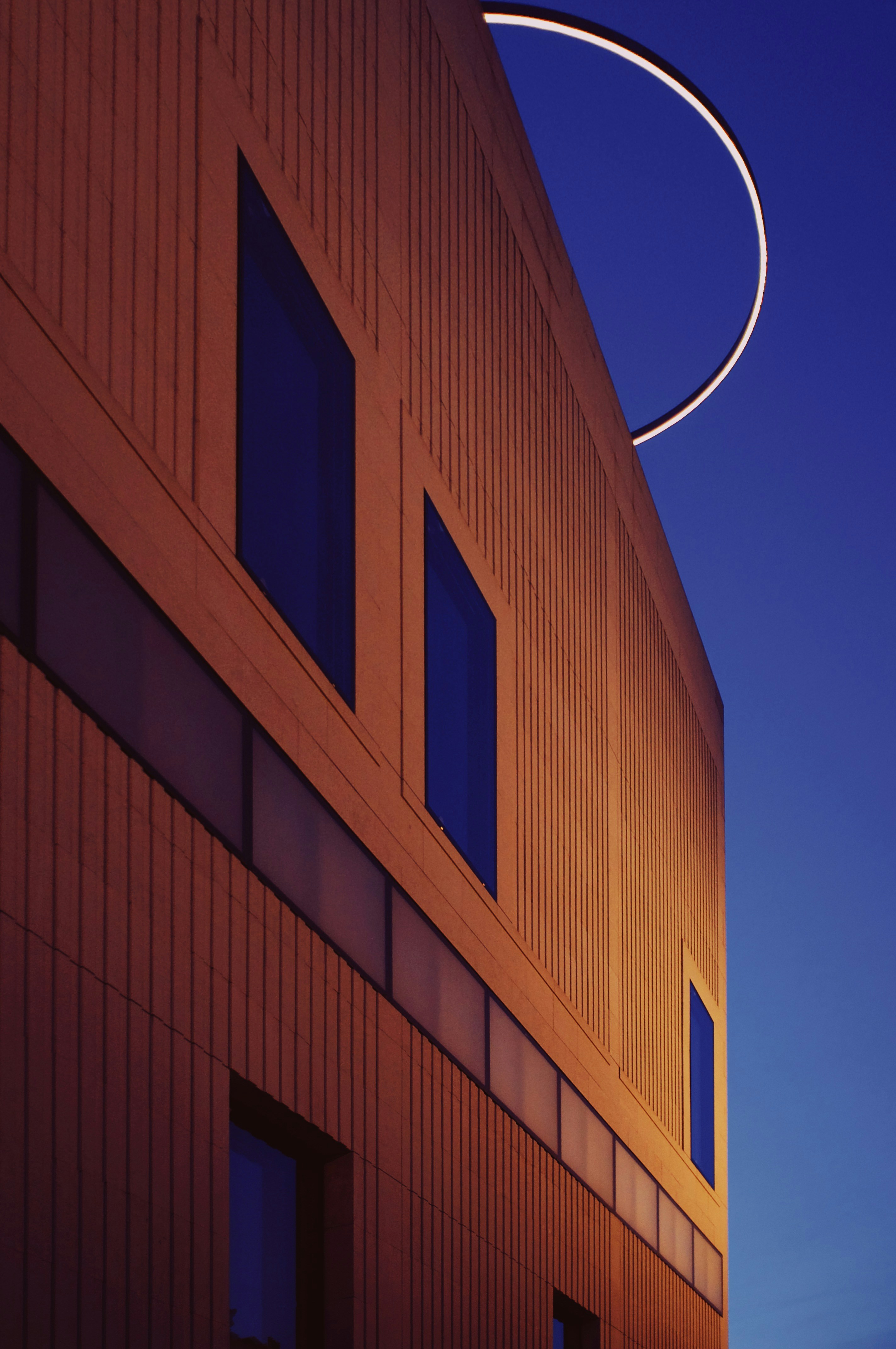 Halo Ring Over a Brick Facade at Golden Hour