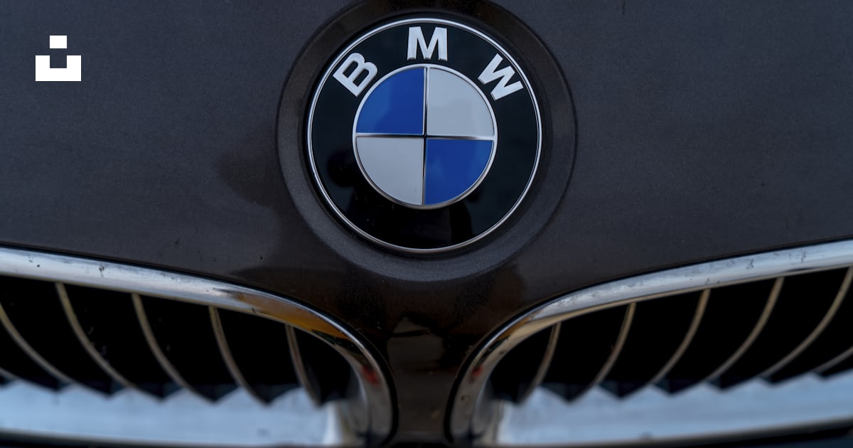 자동차 전면에 있는 Bmw 엠블럼 클로즈업 사진 Unsplash의 무료 로고 이미지