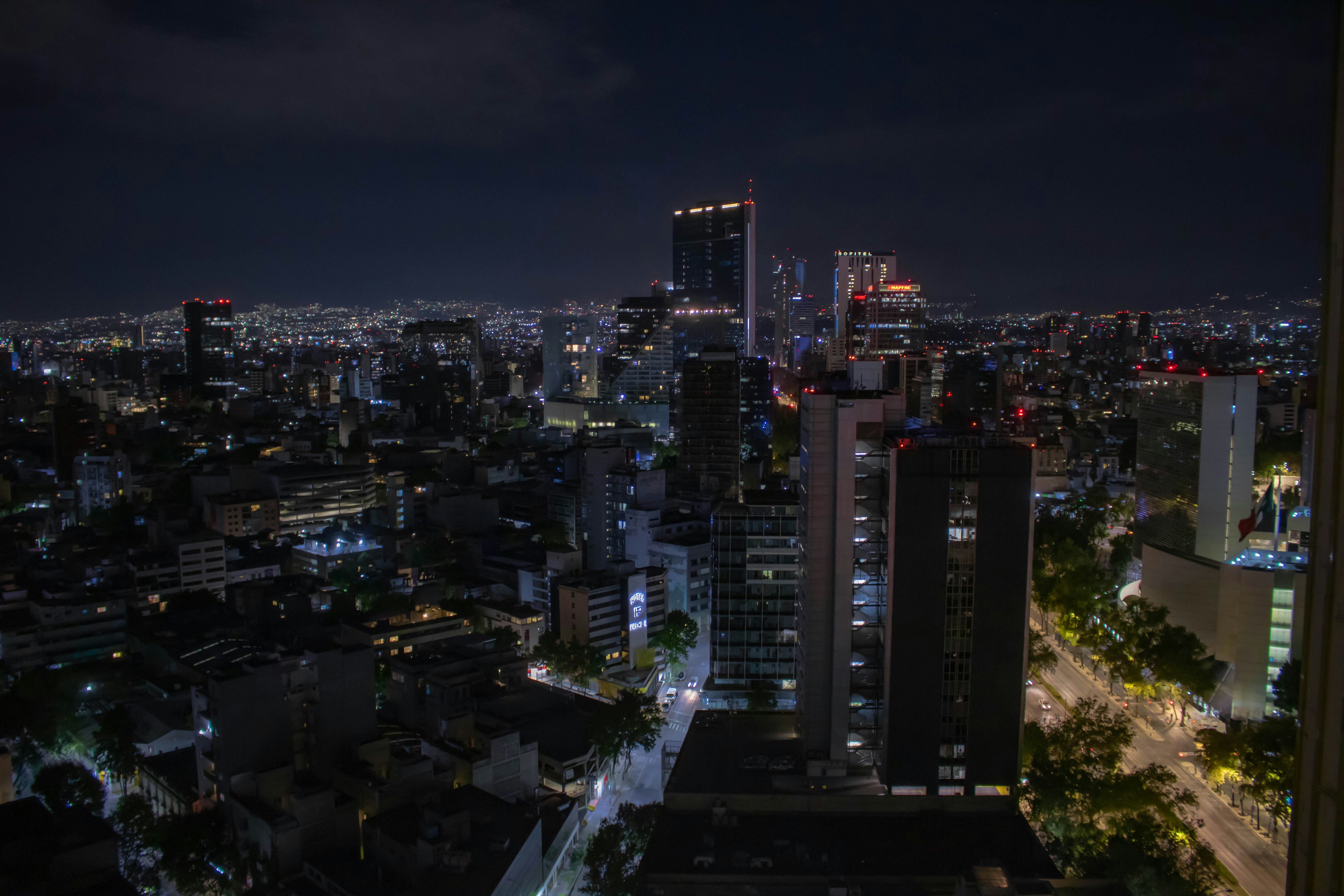 A view of a city at night from a high rise building photo – Free Cdmx ...