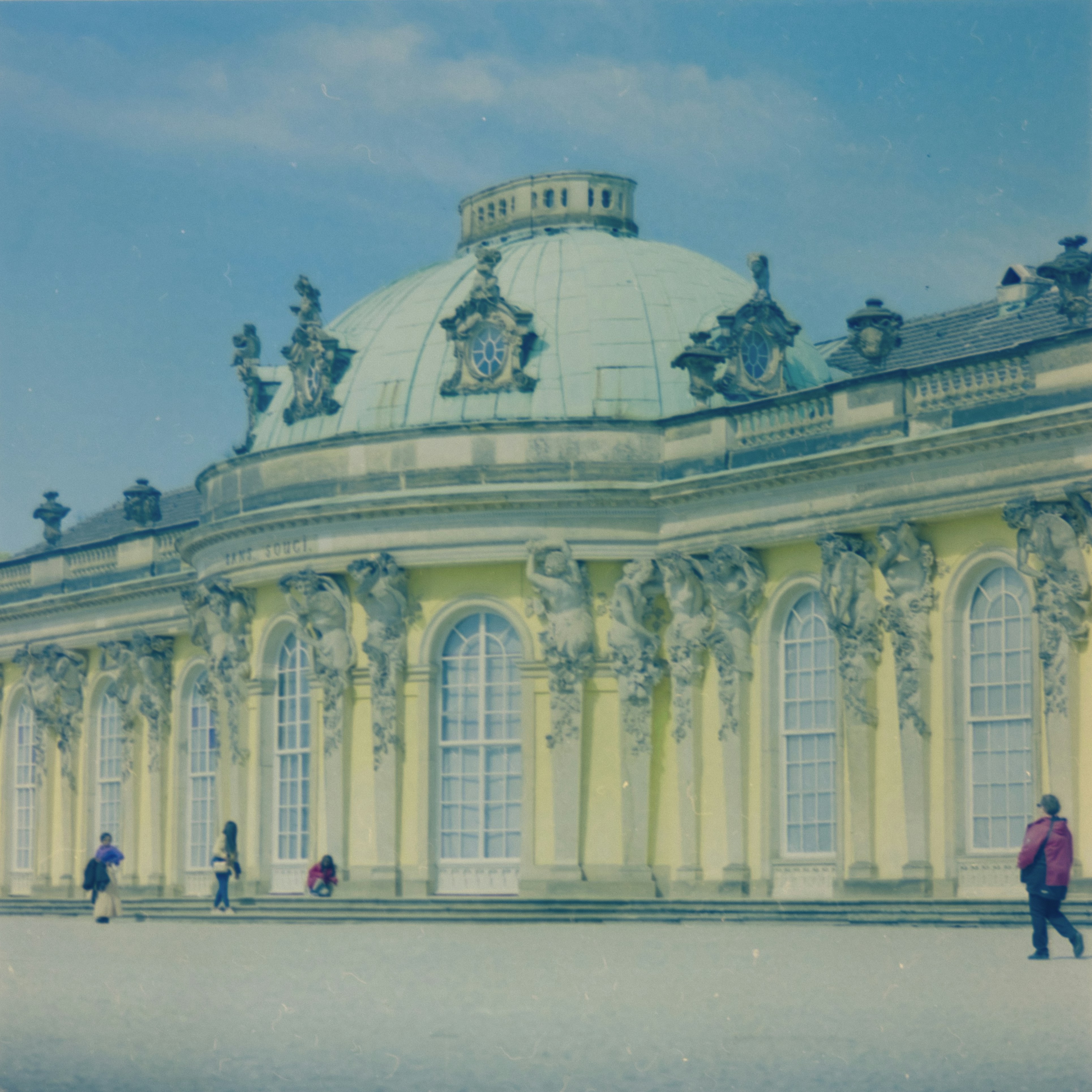 Azure Dome over a Sunlit Baroque Facade